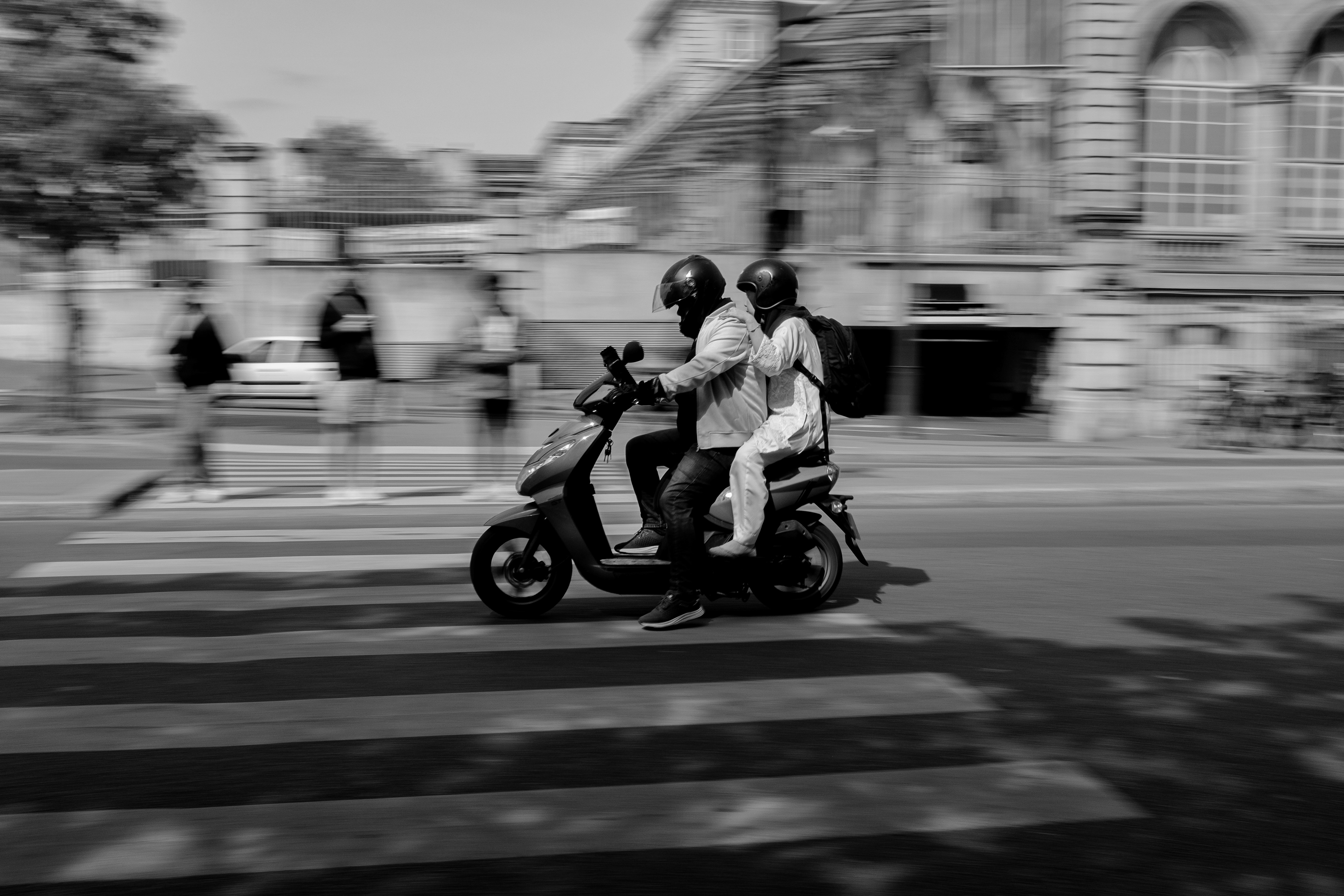 Two Riders, One Journey: Urban Street Rhythm on a Moving Scooter