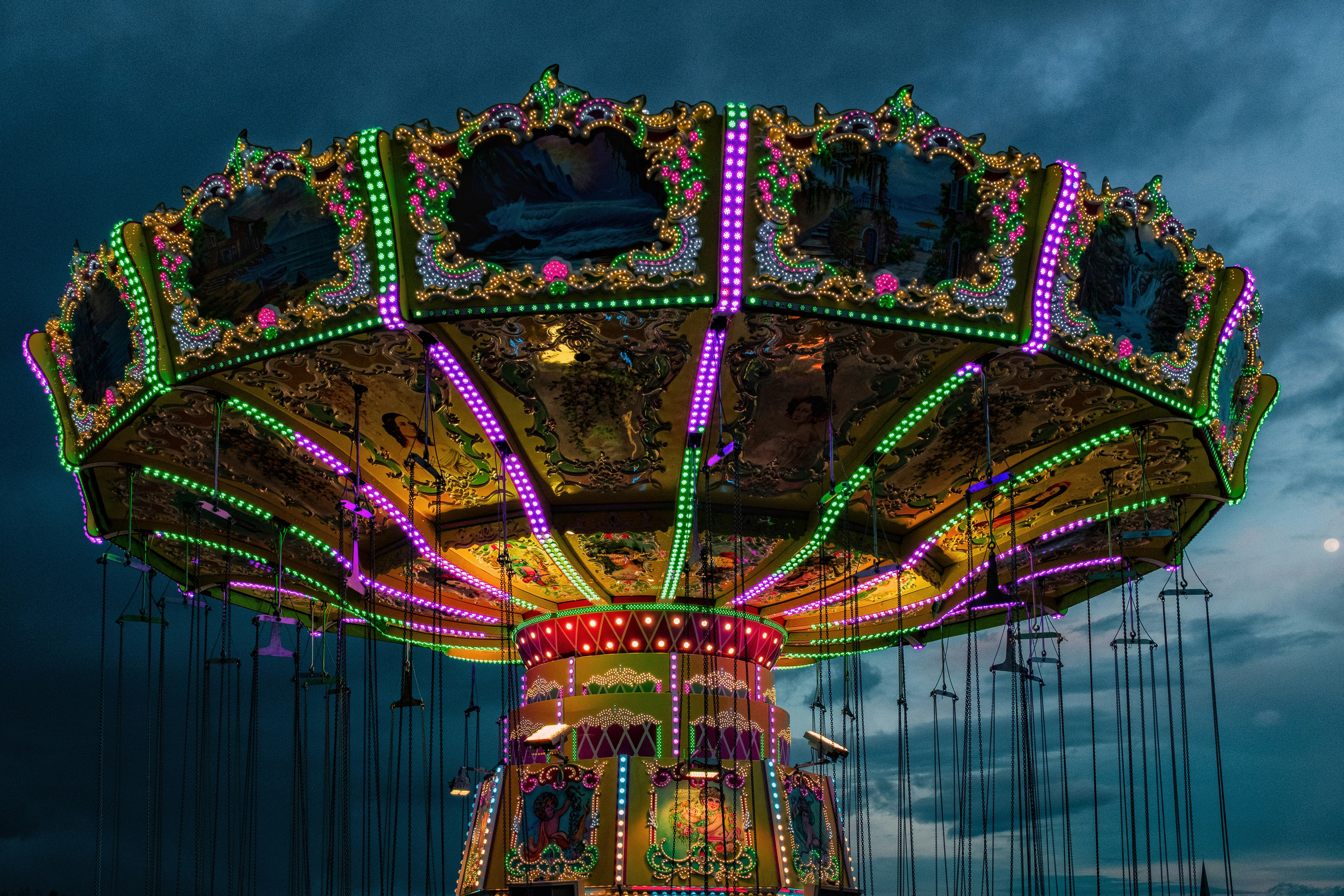 Neon Carousel in the Evening Sky