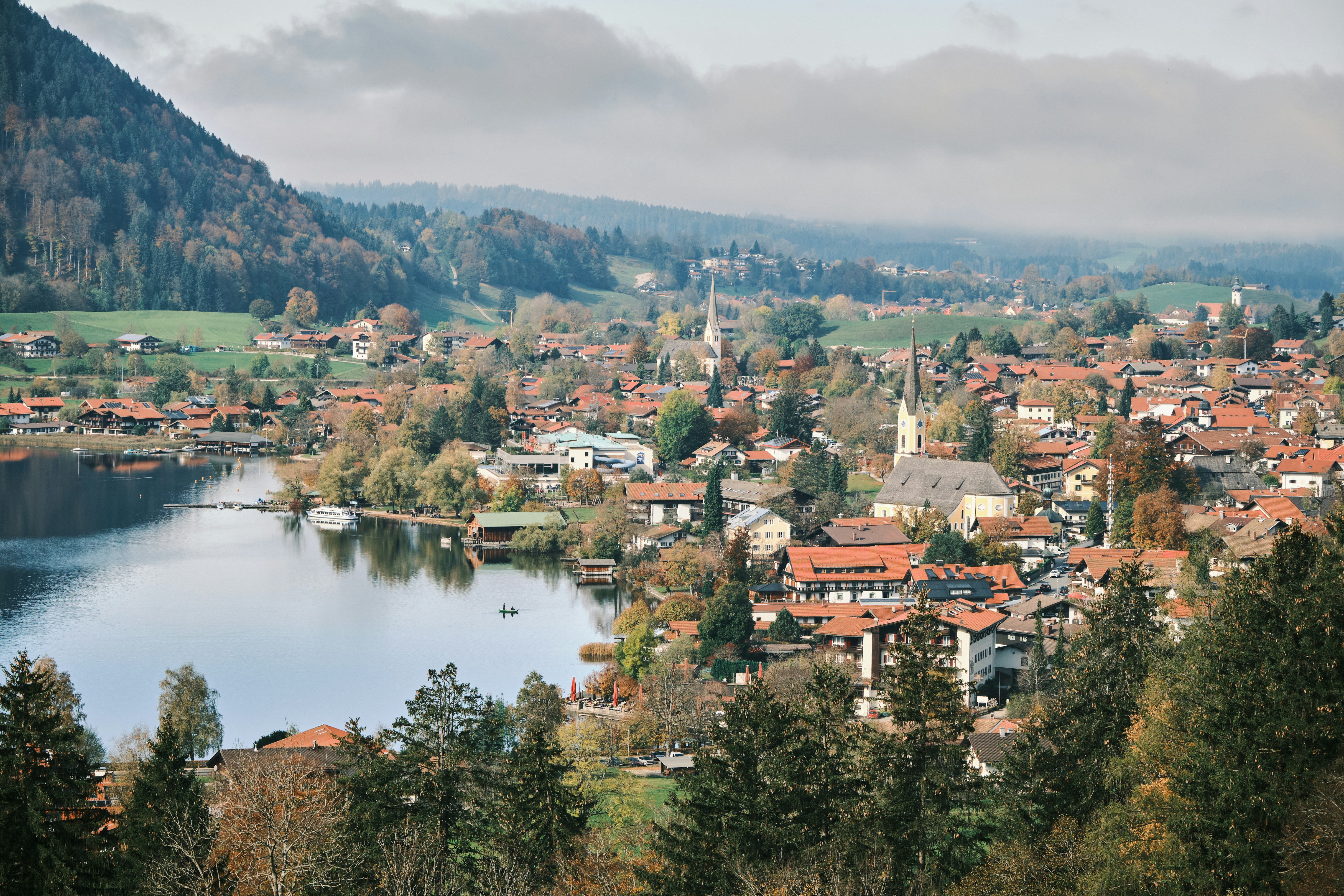 Village by the Lake: Autumn Lines and Riverside Spires