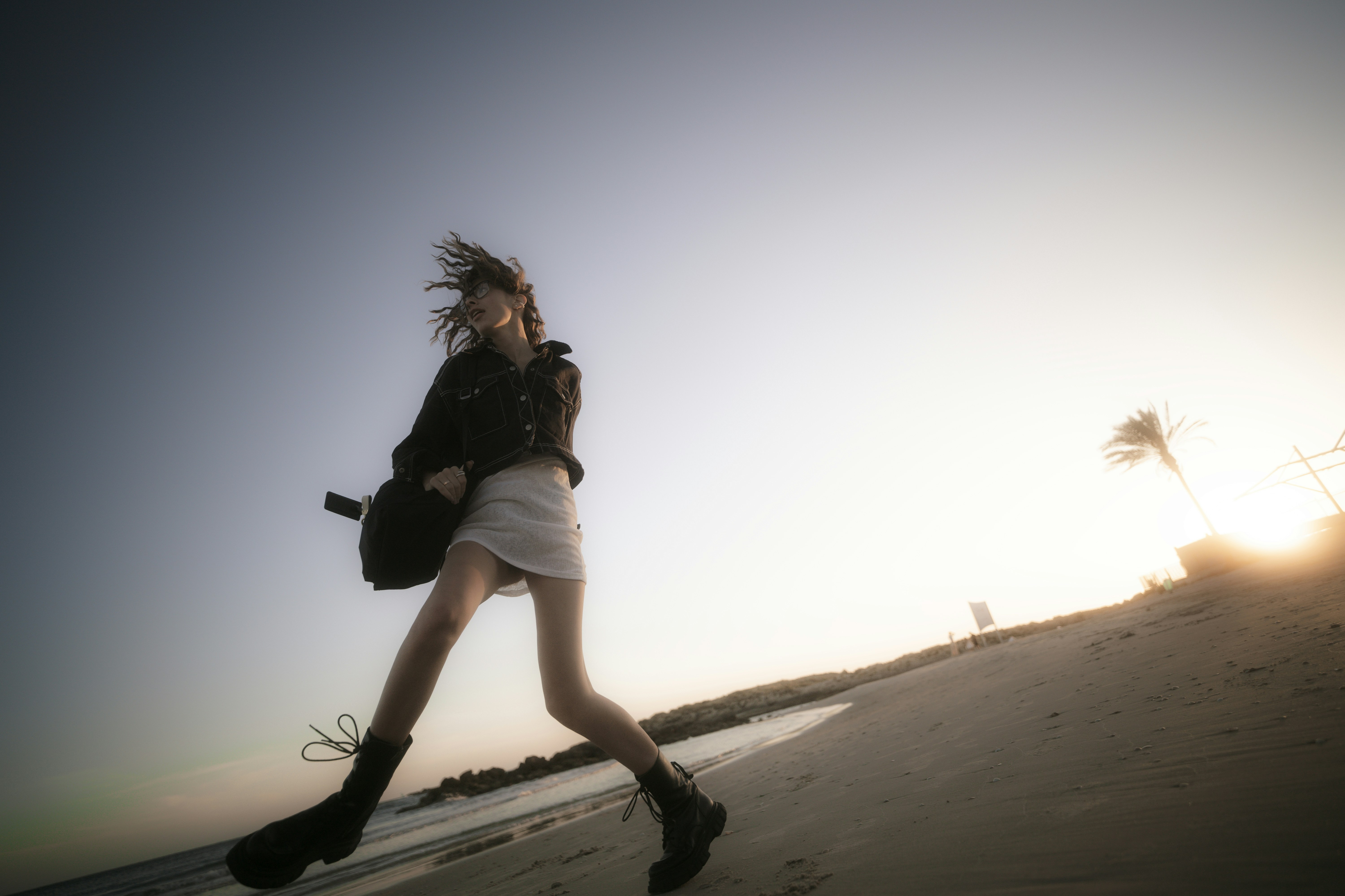 Looming Sprint: Street Style on a Dusk Beach