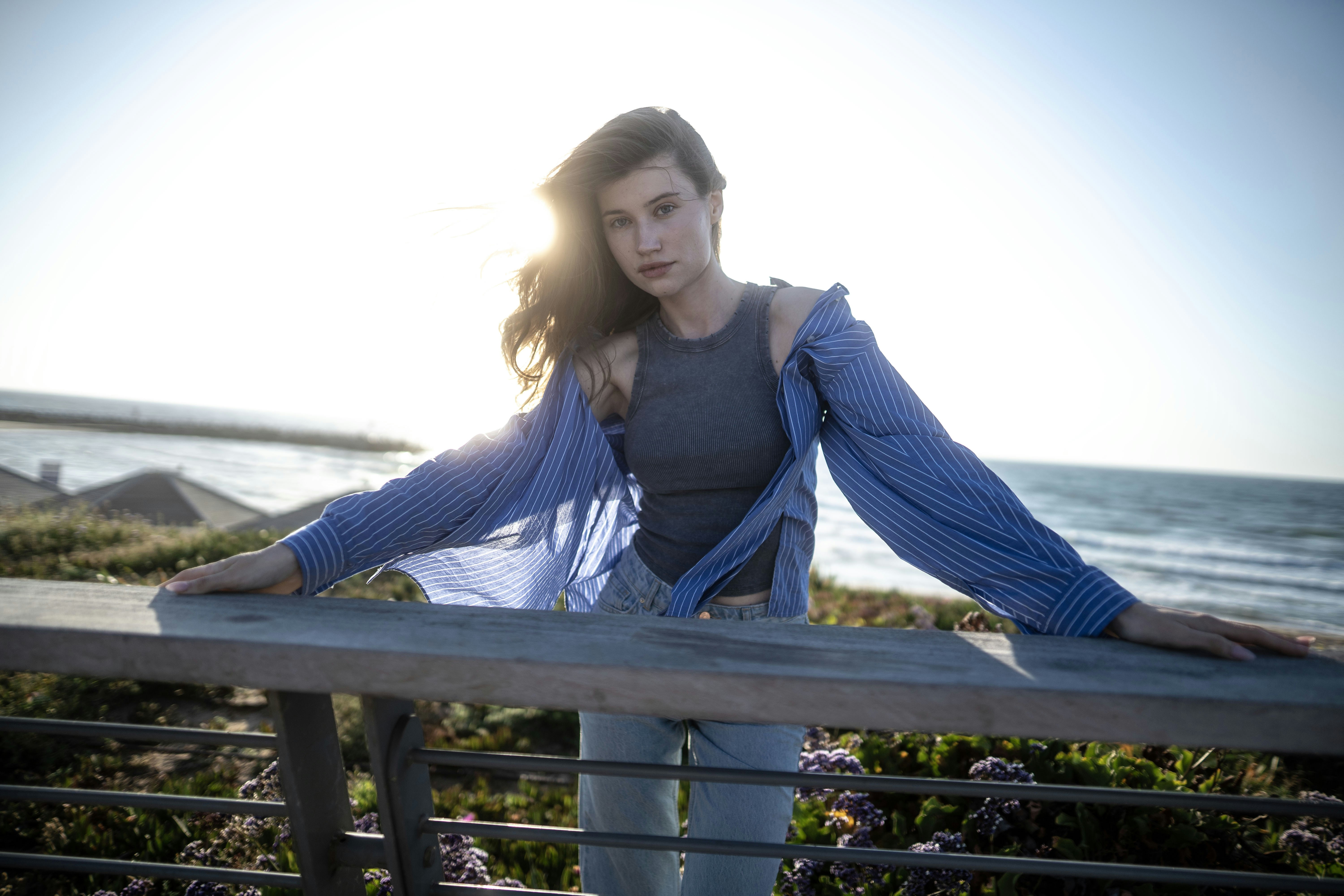 Window to the Sea: A Portrait at Golden Hour on the Boardwalk