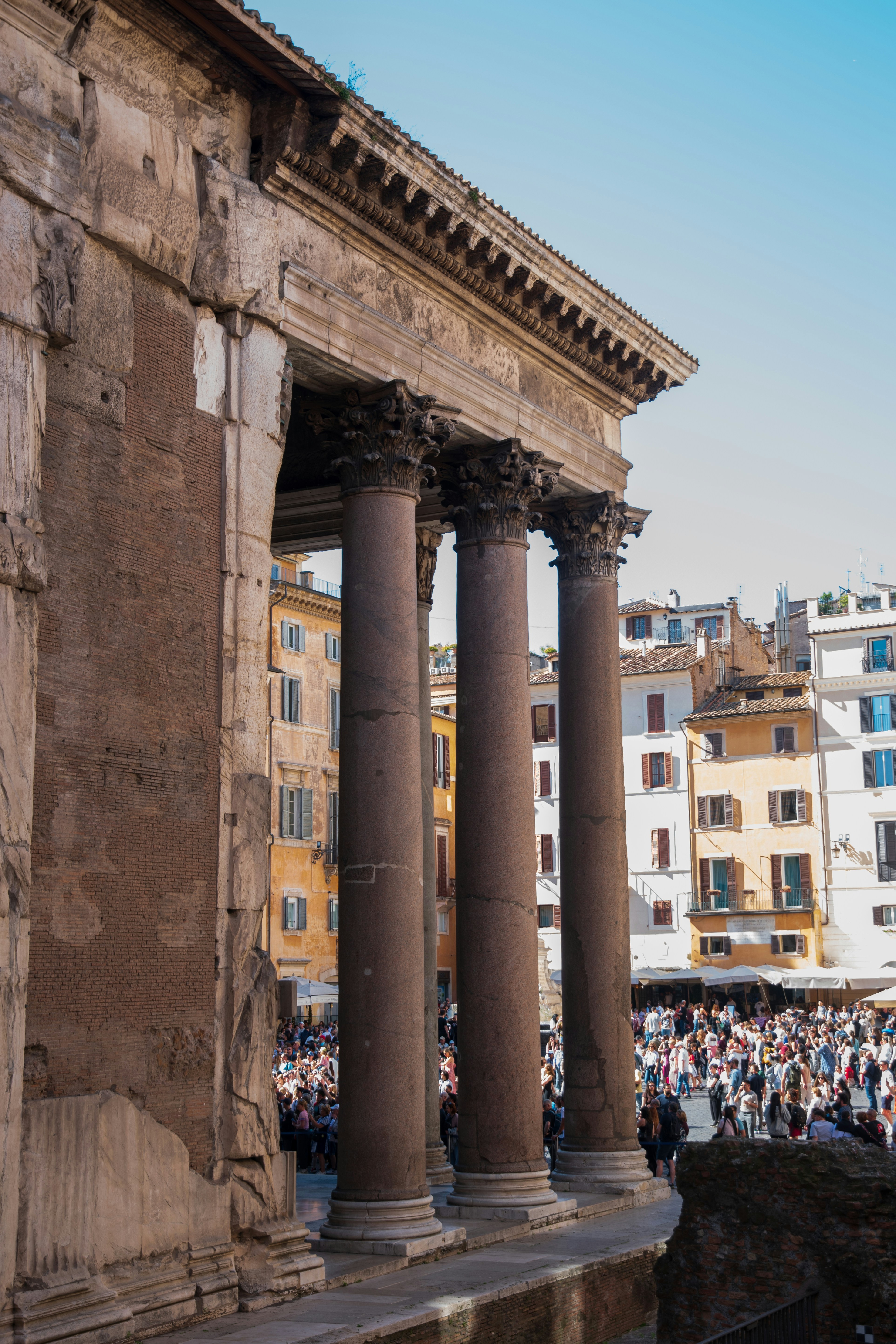 Ancient Columns Framing a Bright Piazza