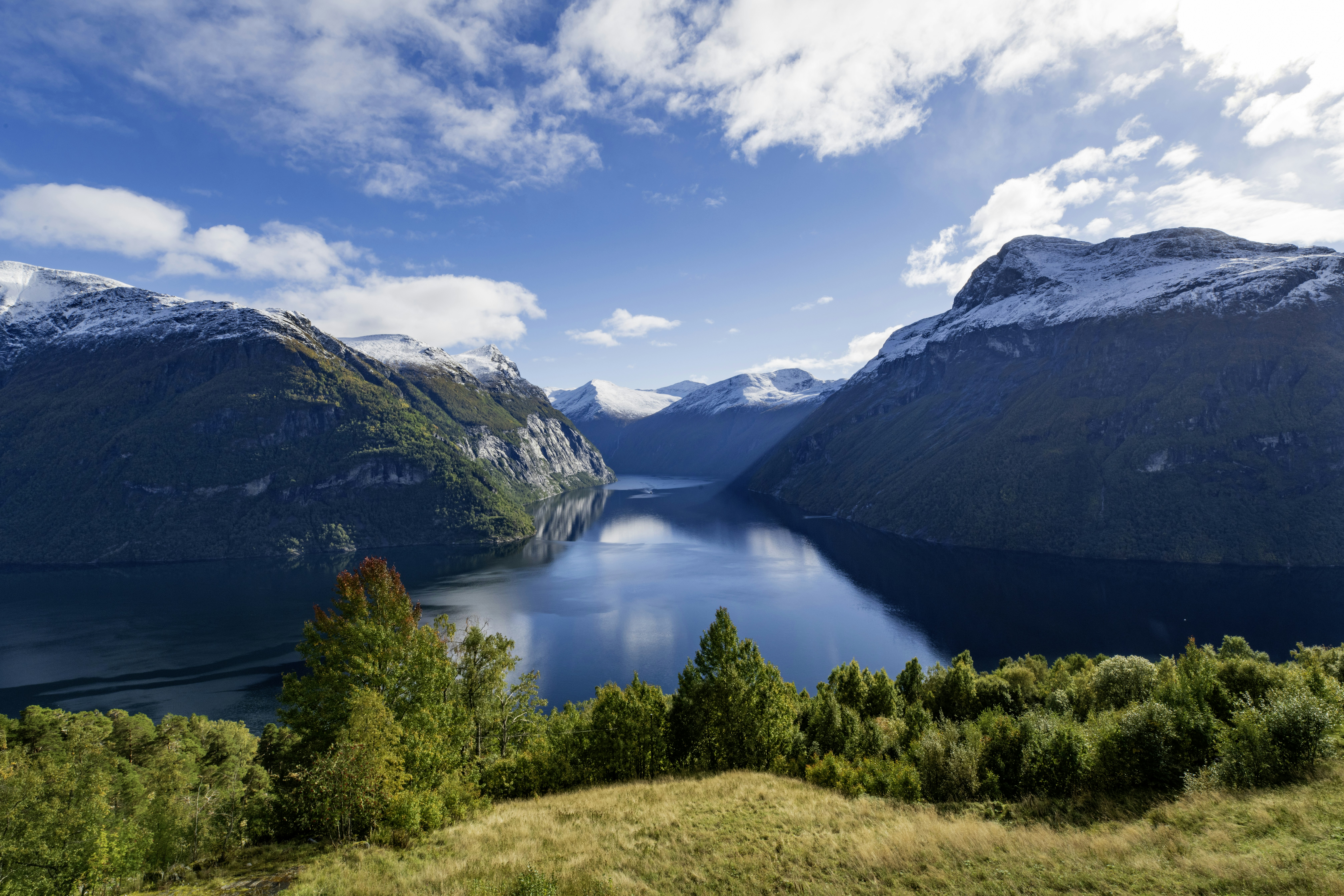 Emerald fjord under a Nordic noon