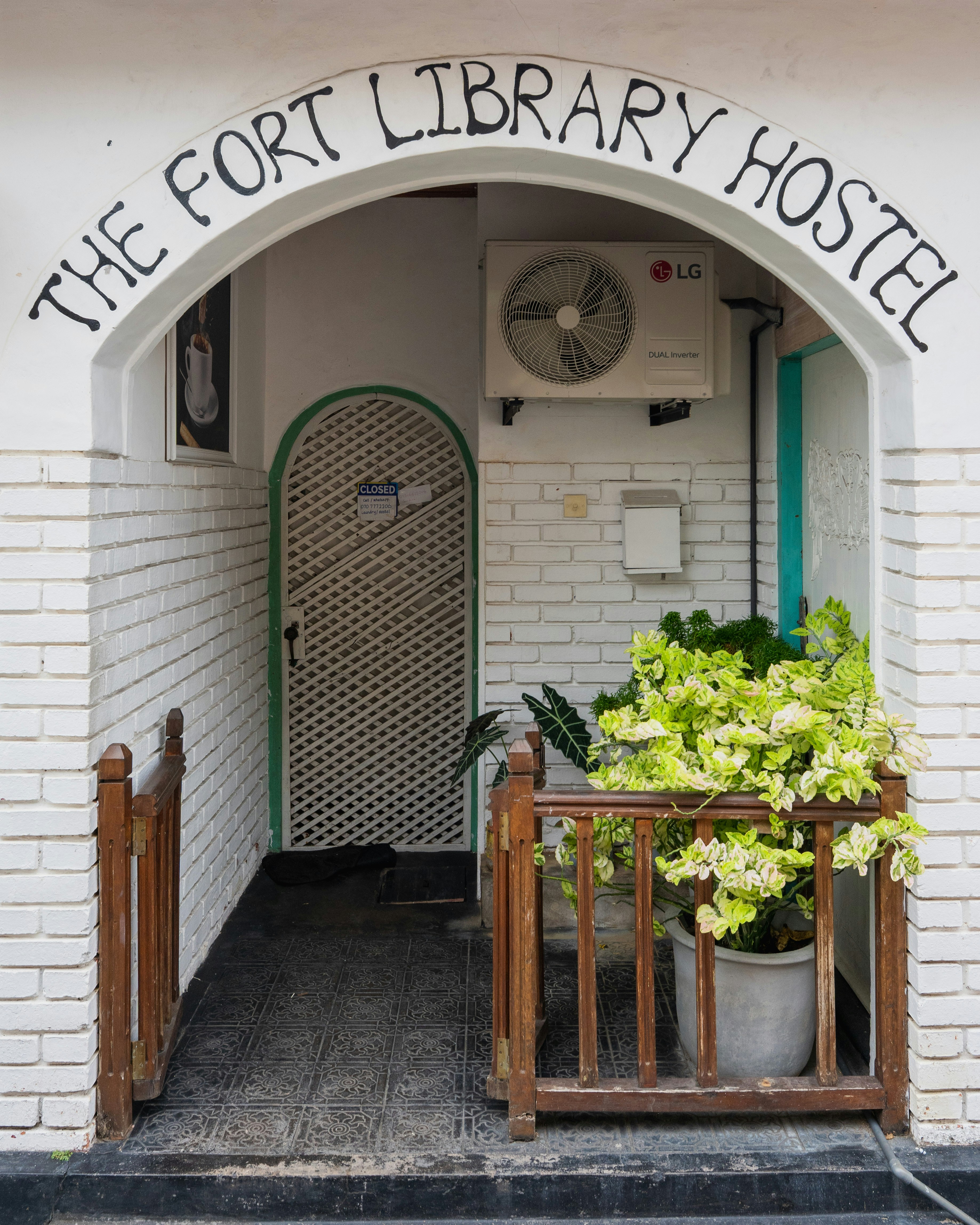 Arched Entryway to The Fort Library Hostel