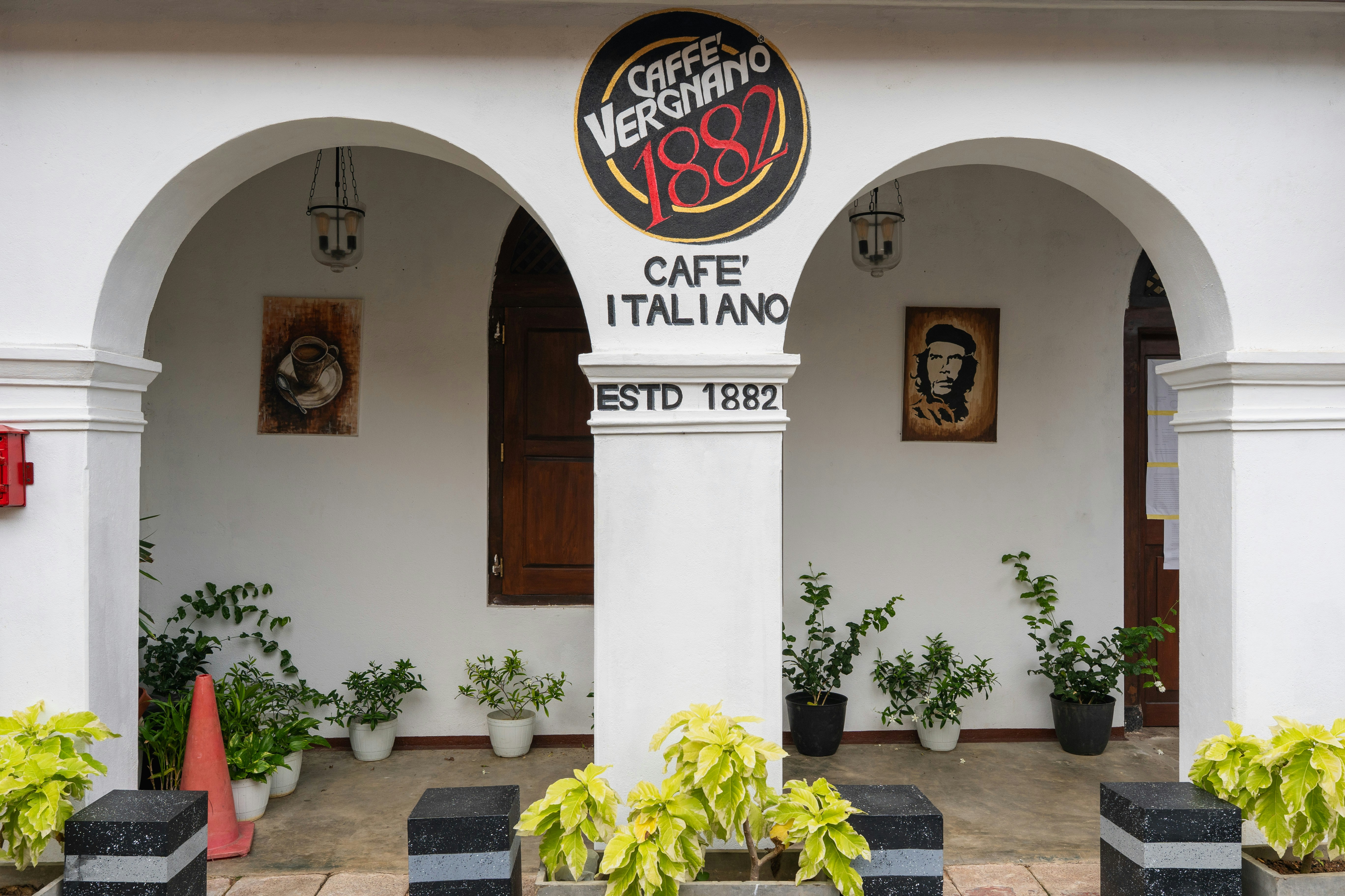 Arched Cafe Entrance with Central Signboard