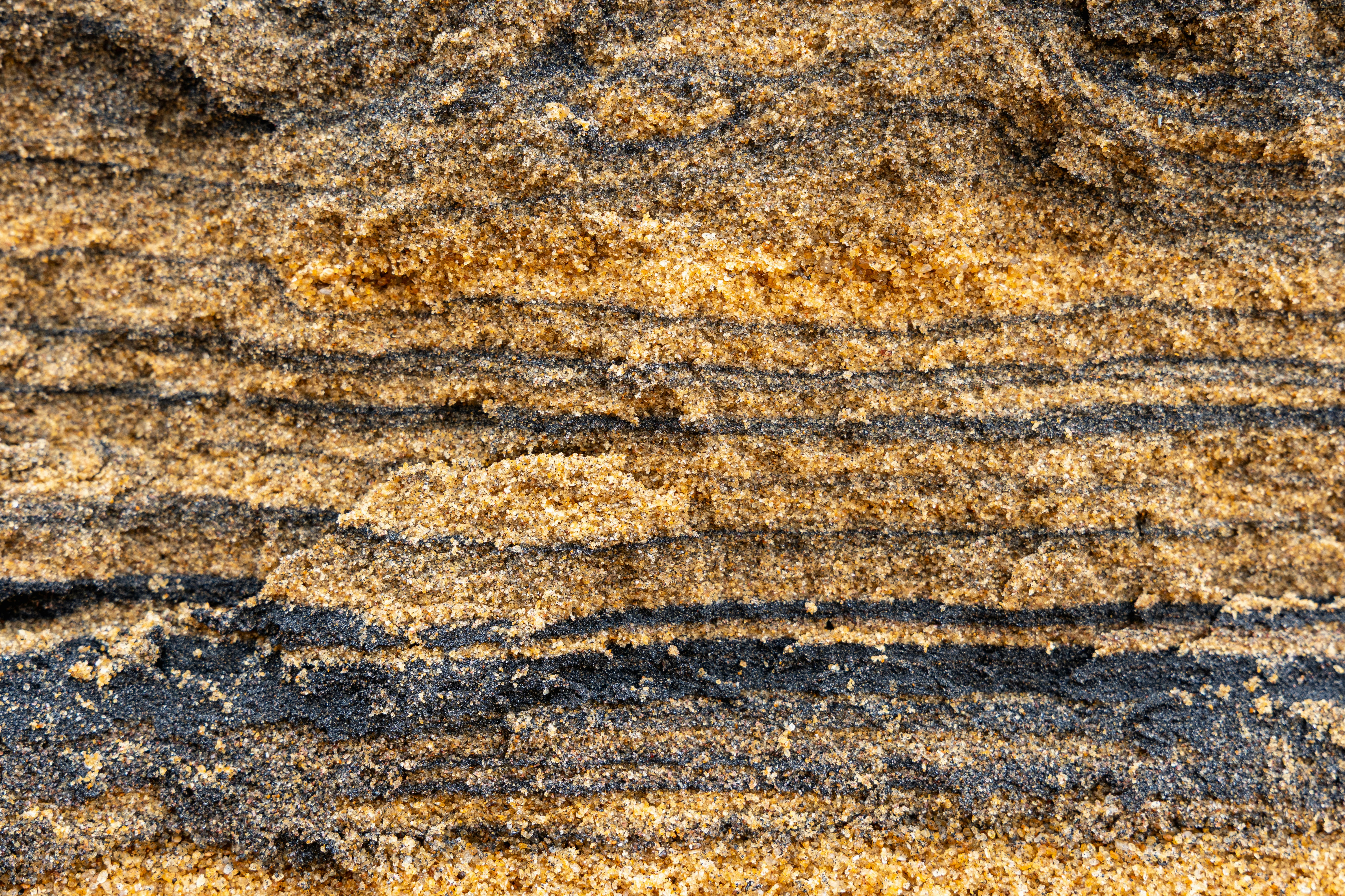 Stratified Sands: Buried Time in Weathered Ridges