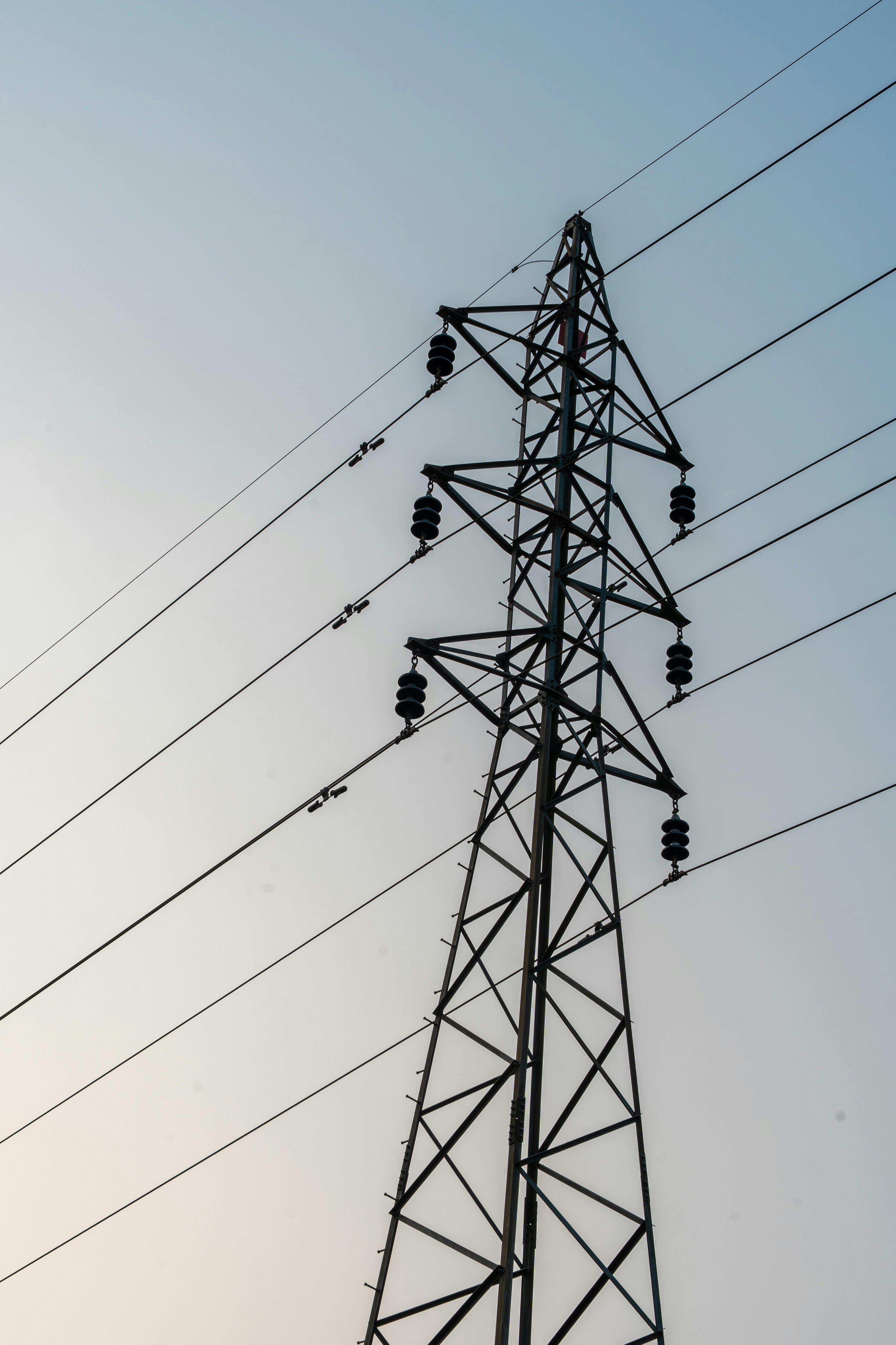 Steel Lattice Tower Reaching Toward a Clear Sky