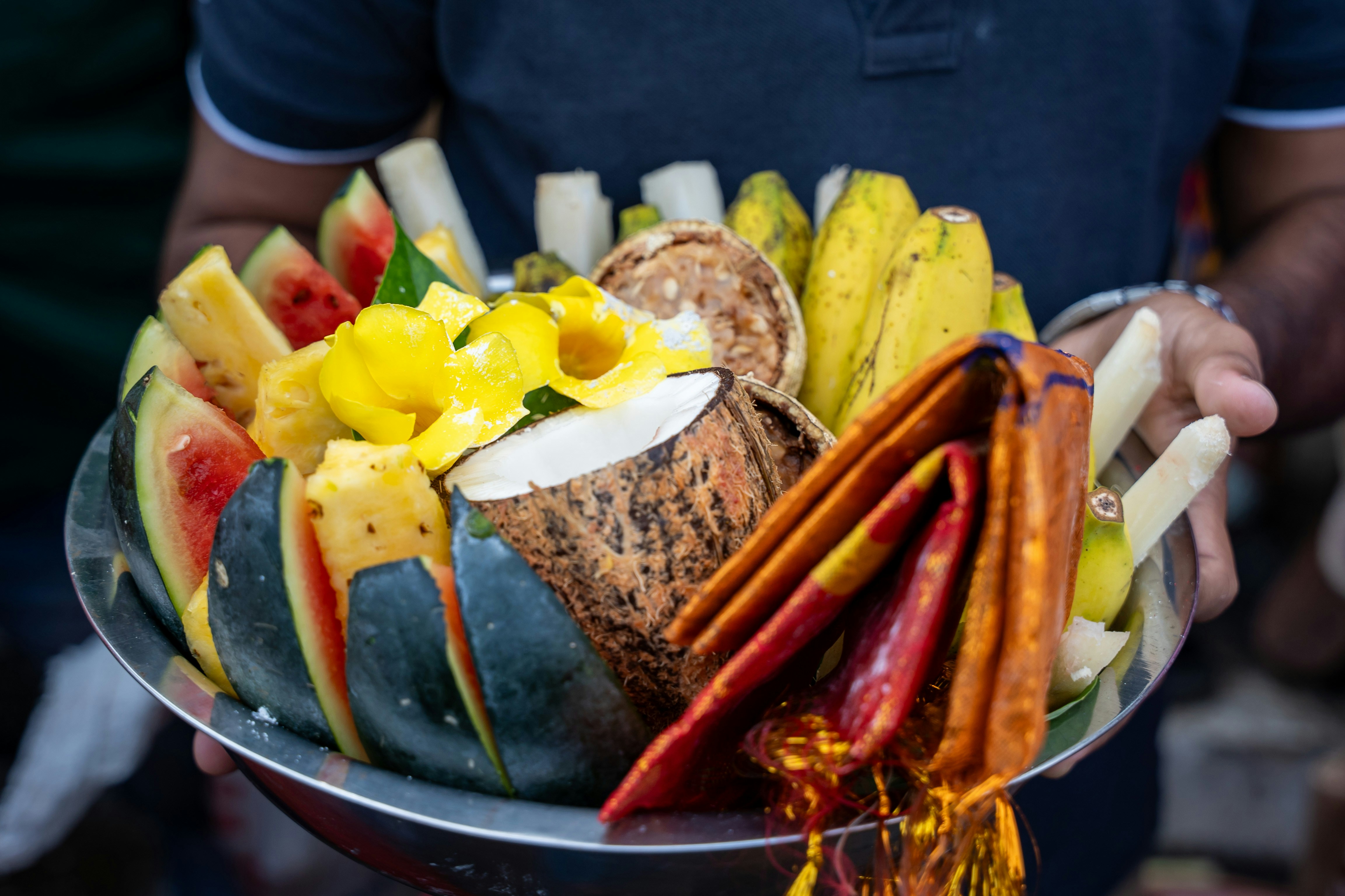 Colorful Fruit Boat: A Banana-Coconut Medley Served in a Half-Shell Crown