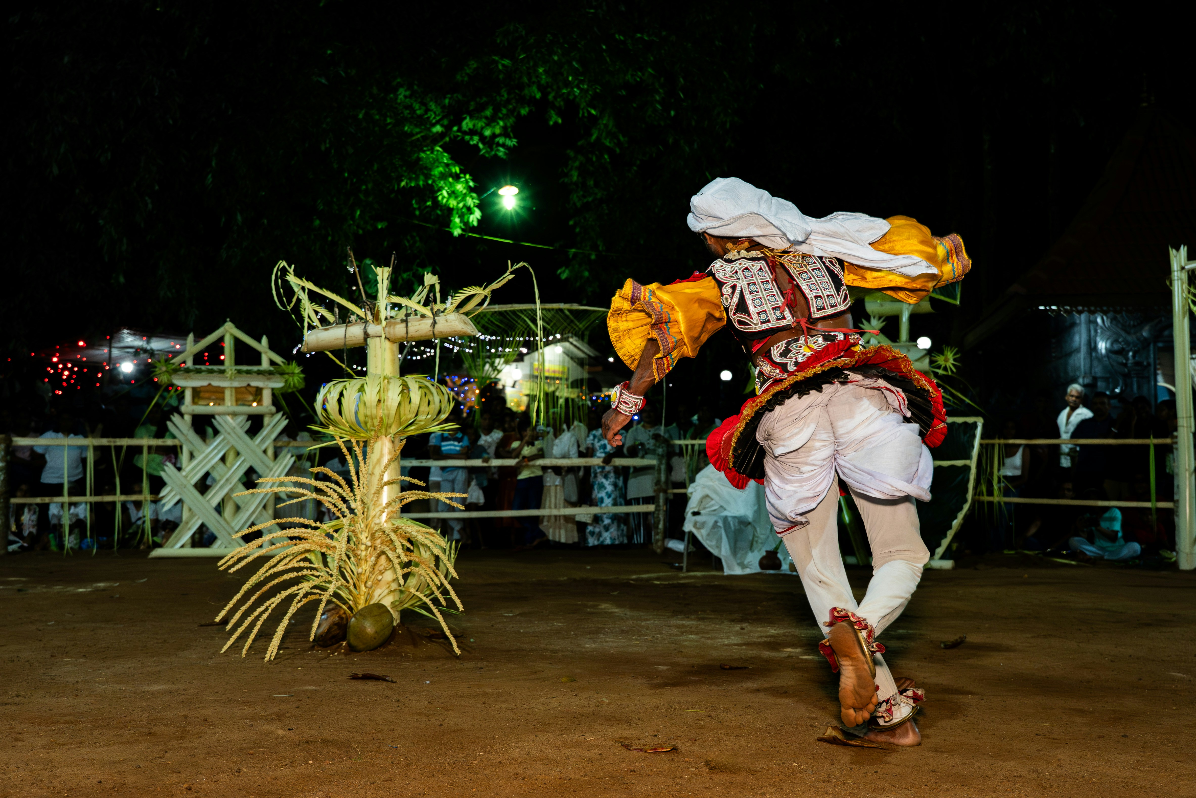 Circus of Fire: Dancer in Motion Beneath Lanterns