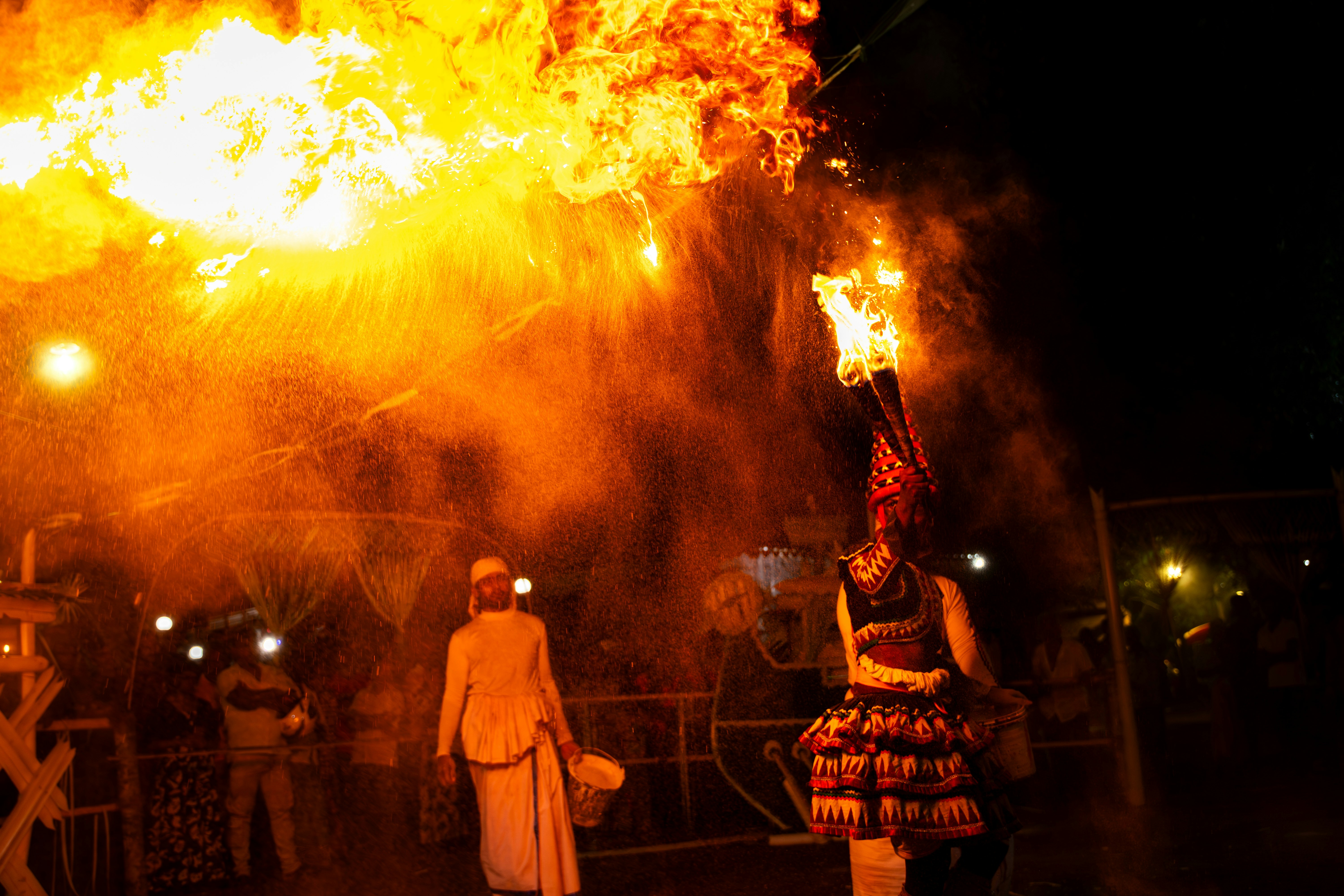 Flame Dancers at Night: A Ceremonial Glow