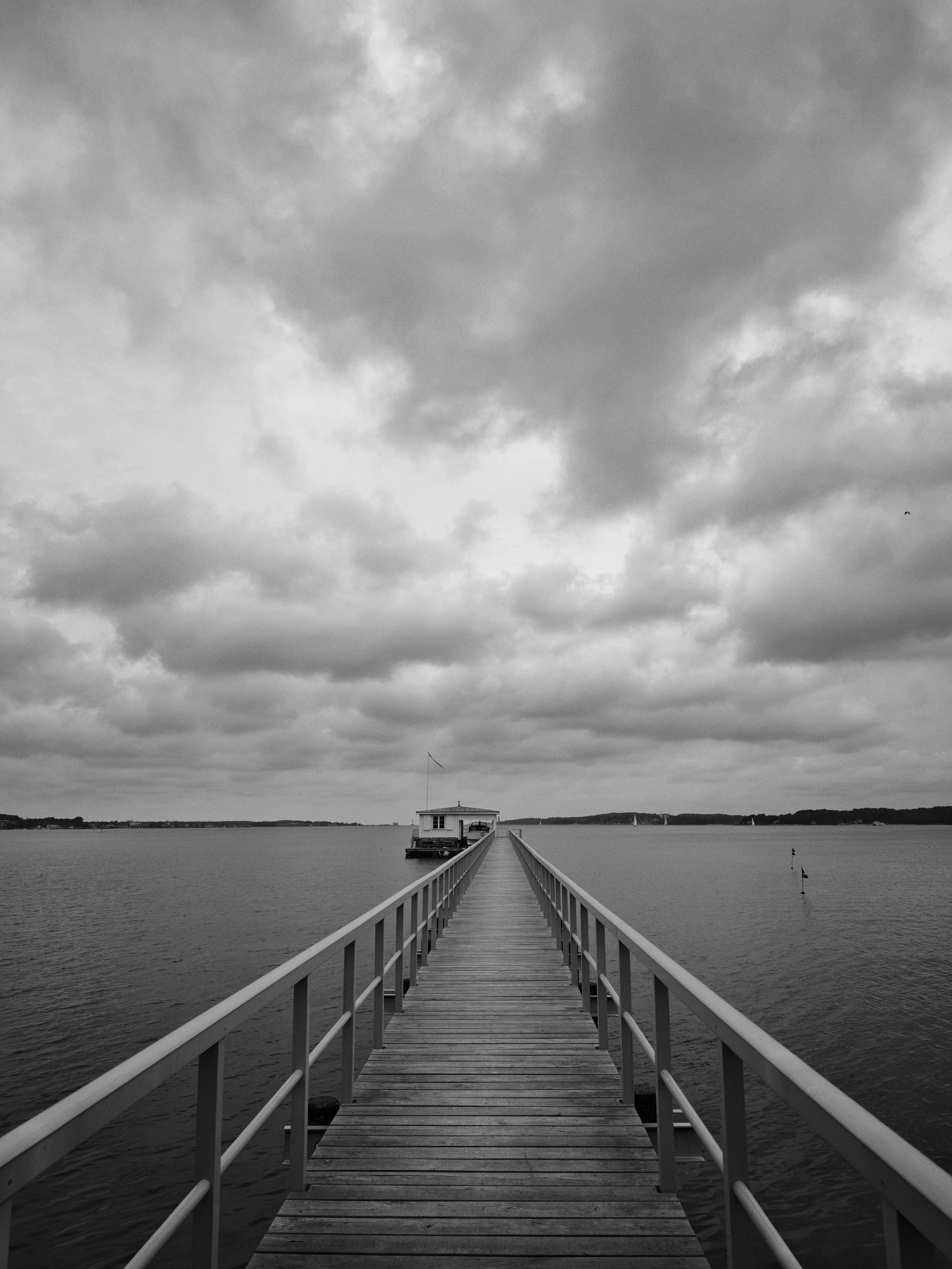 Pier Toward the Horizon: A Quiet Voyage Across Steel and Sky