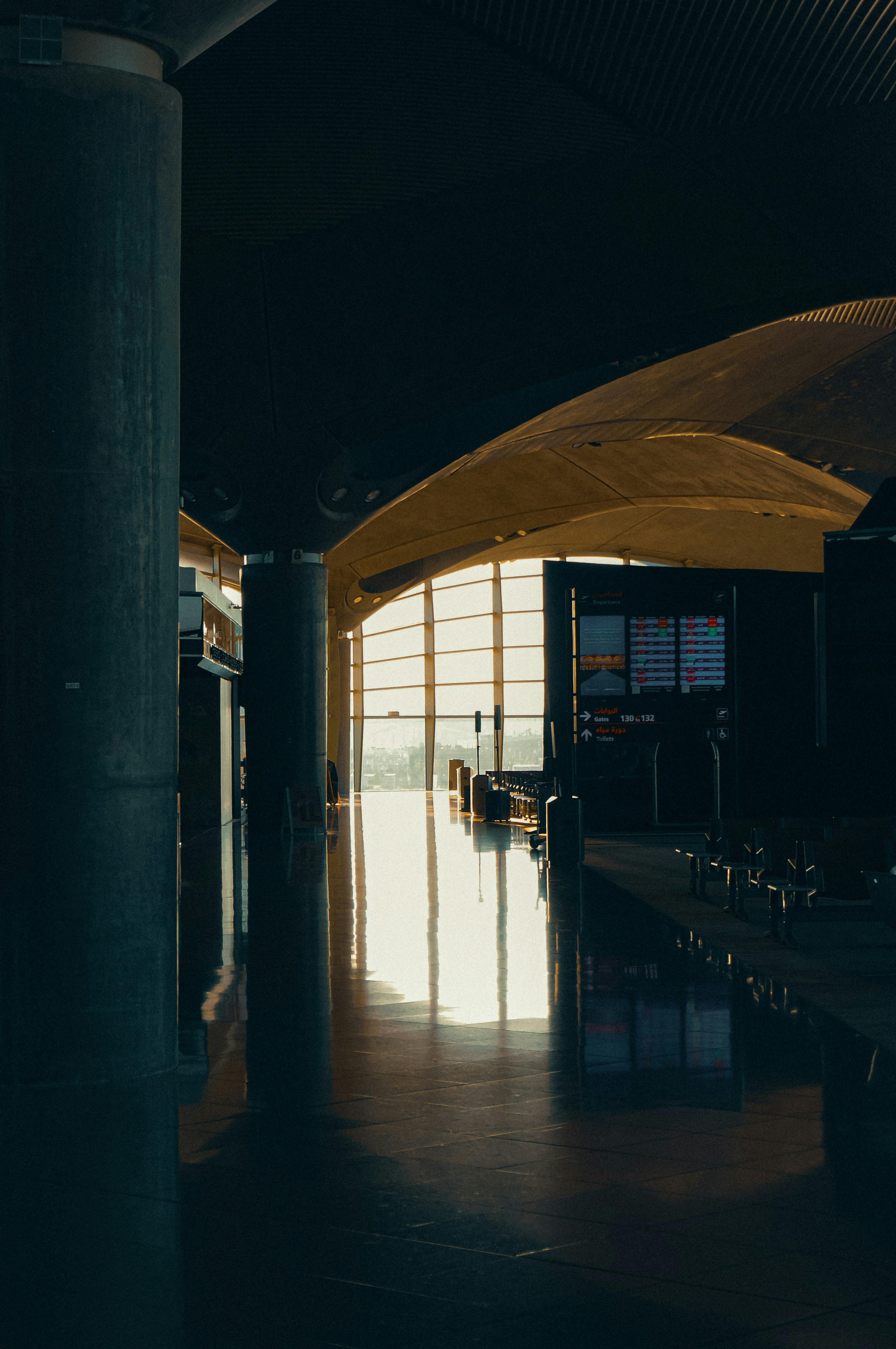 Sunlit Terminal Corridor: Quiet Echoes Between Columns