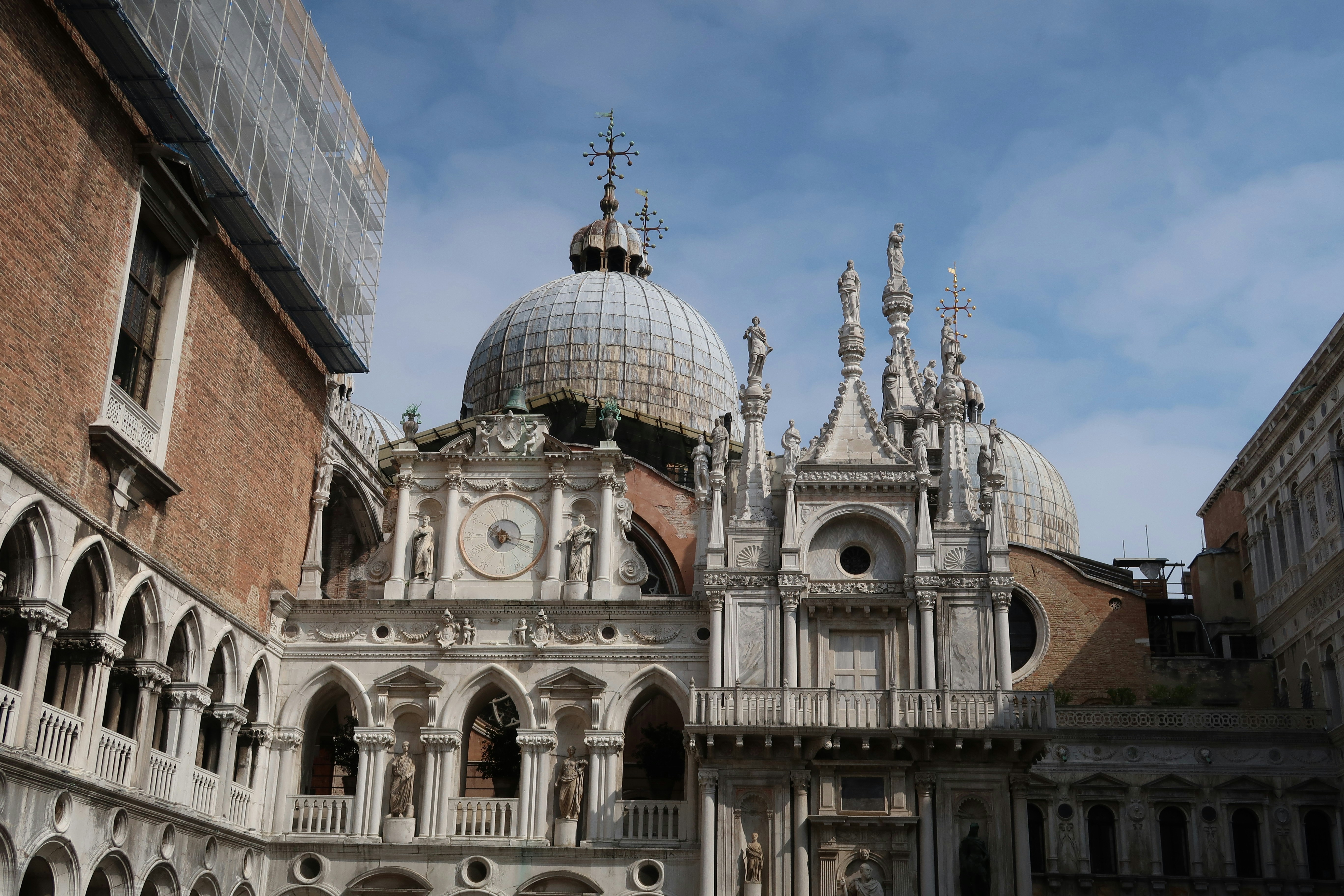 Domed Cathedral Details: Ornate Facade Framing a Venetian Sky