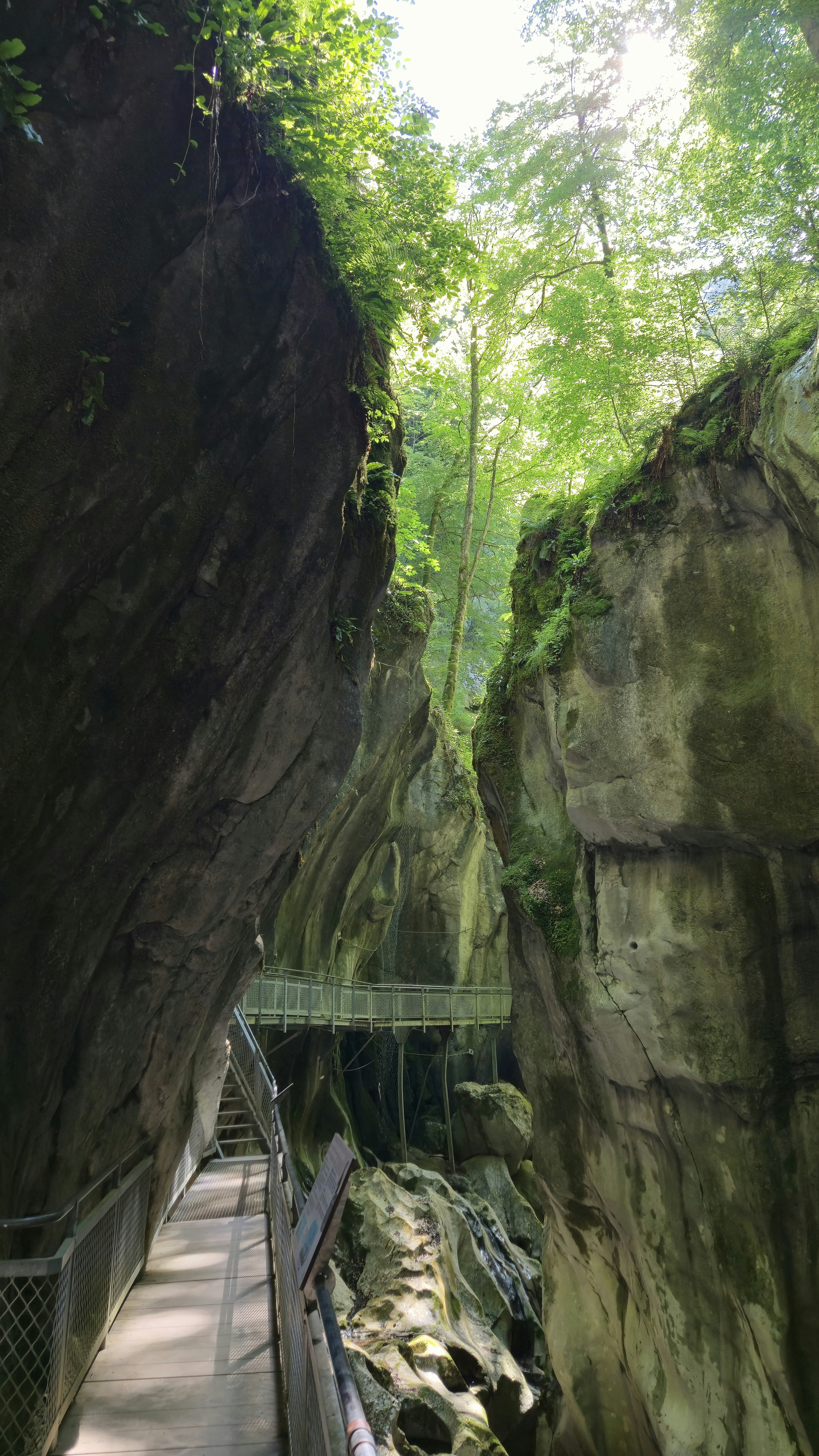 Stone Channel Corridor: A Bridge Threaded Between Cliff Faces