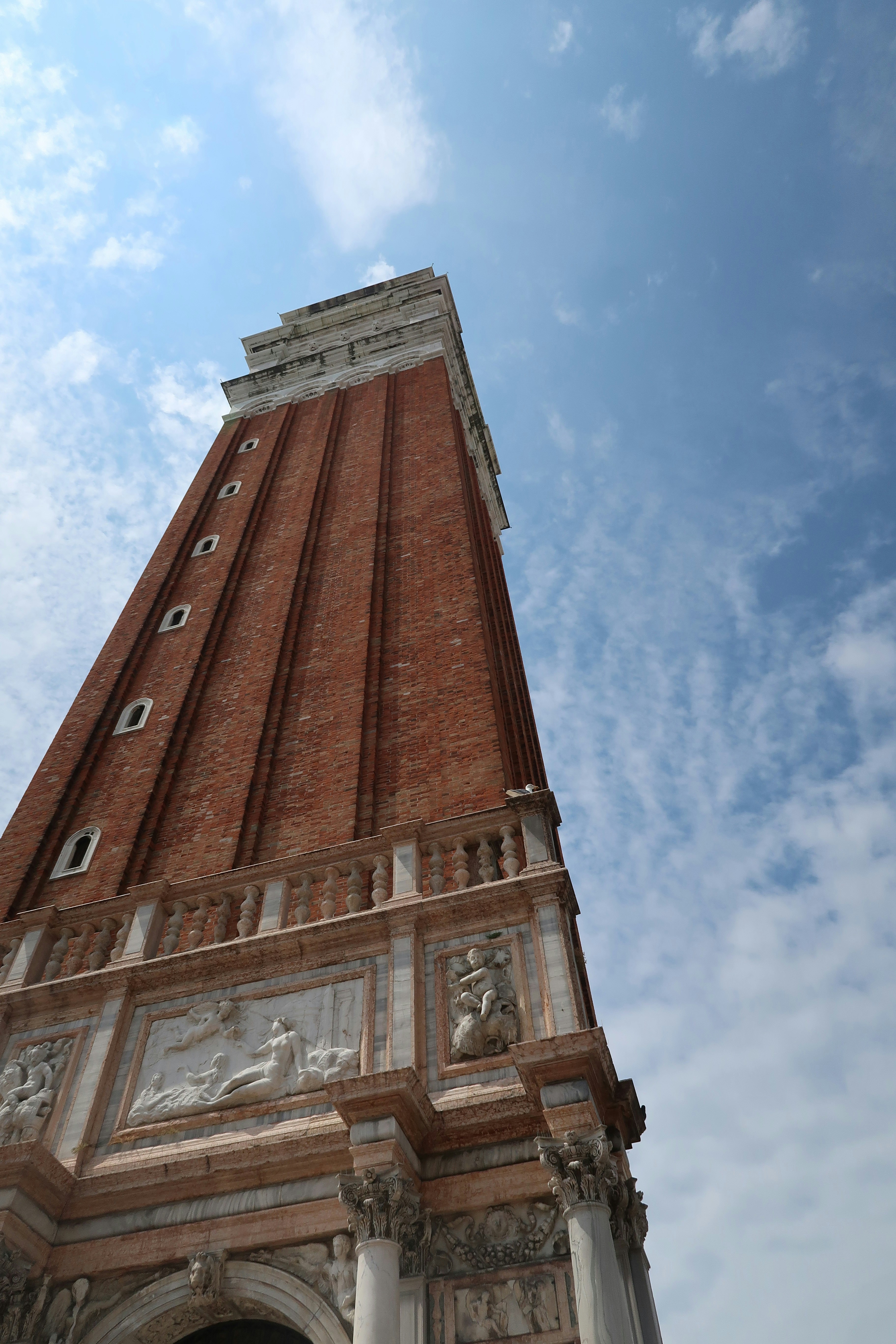 Brick Tower Reaching Toward a Clear Sky