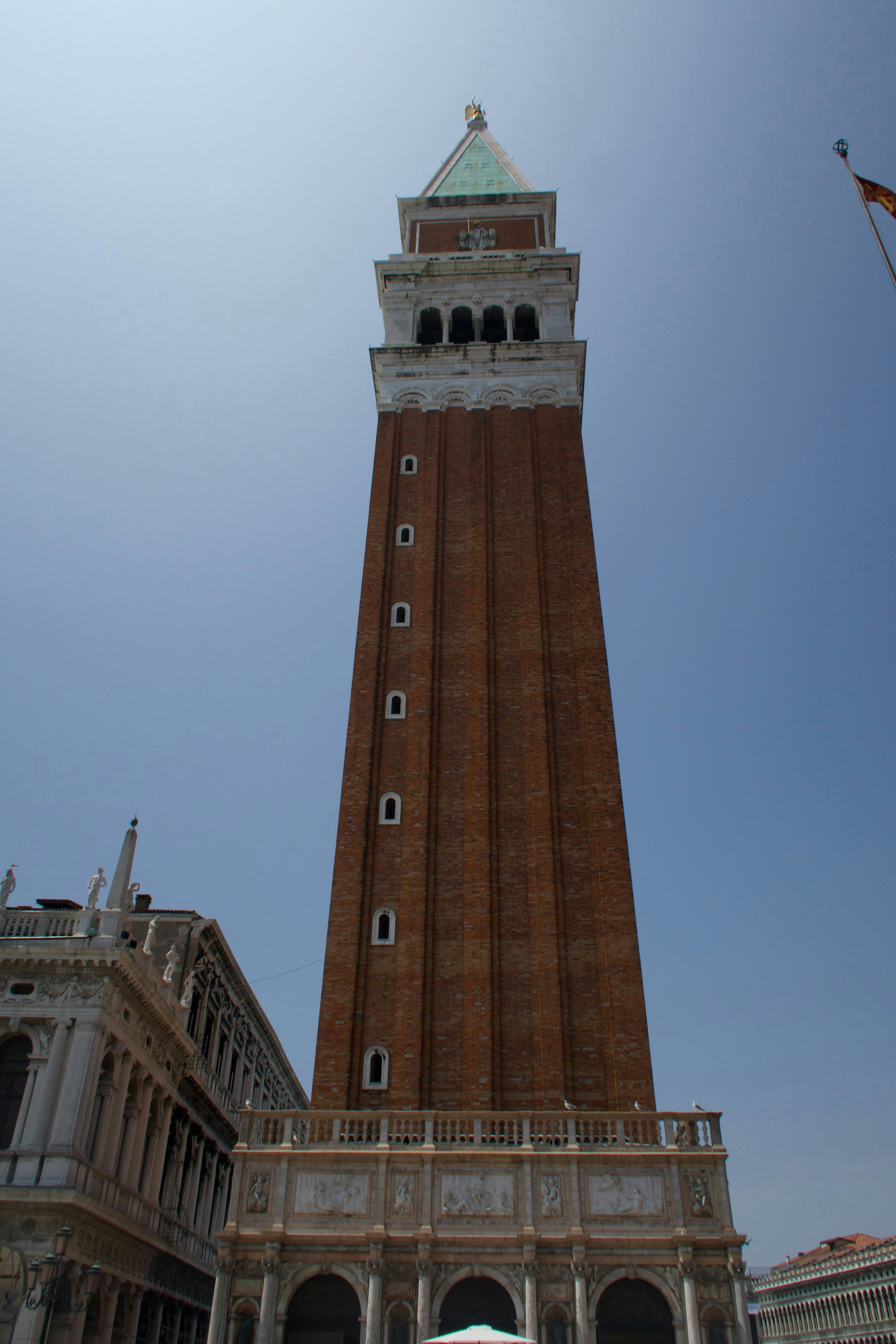 Towering Venetian Fenestration: St. Mark’s Campanile against a Clear Sky