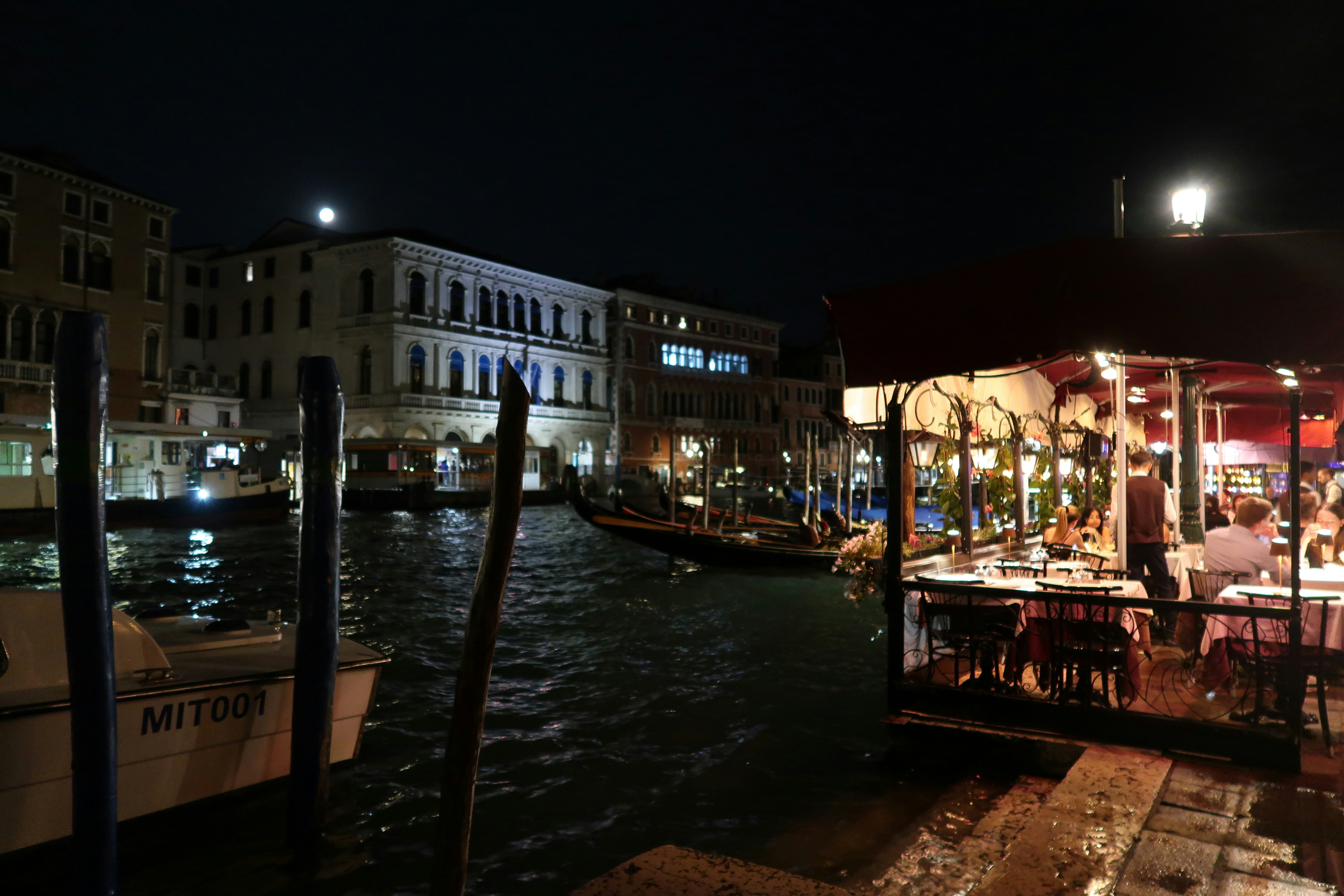Venetian Night: Moonlit Canal and Cozy Pierside Dining