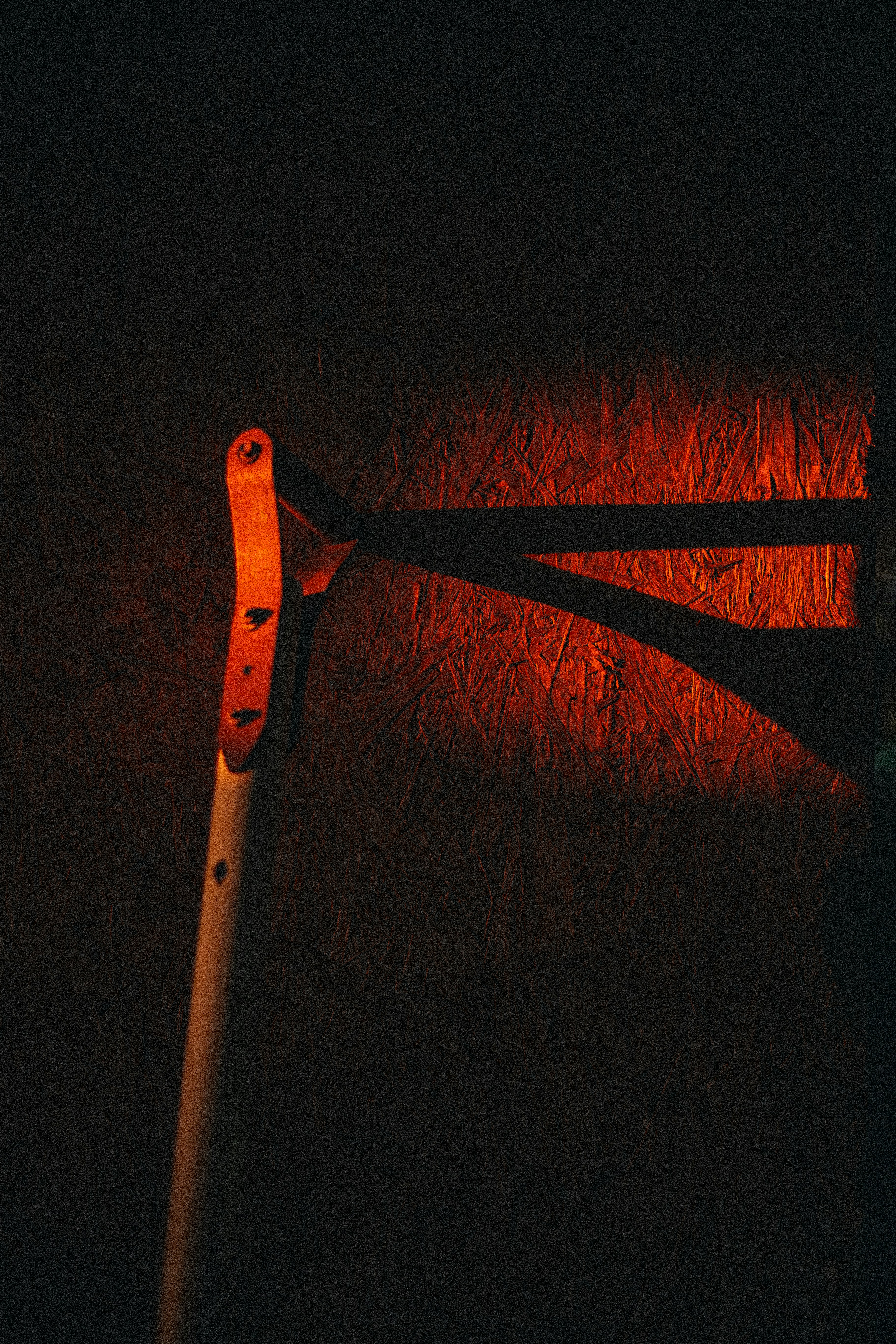 Half-Pulled Shade: A Folding Tool Cast in Ember Light