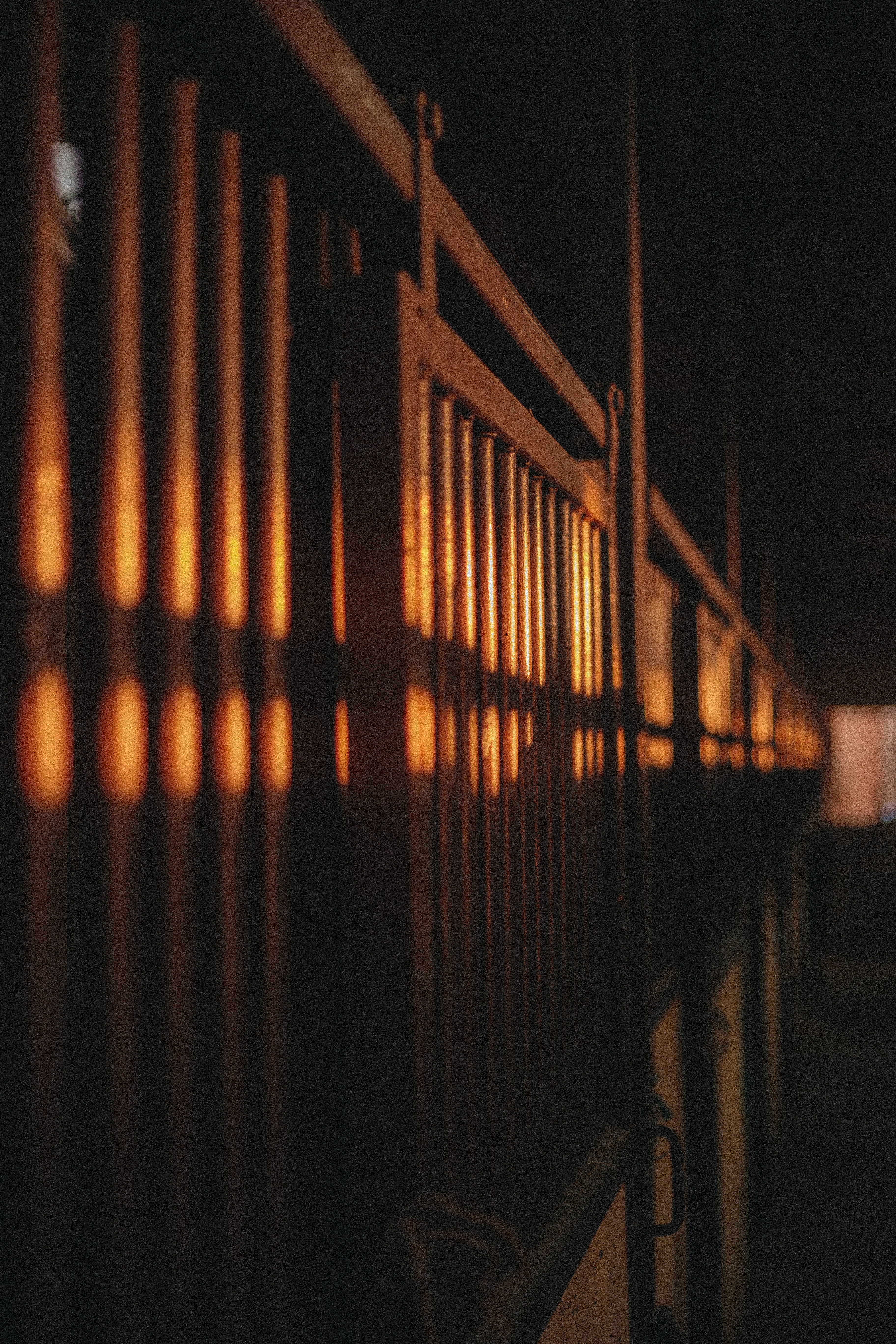 Golden Railings in the Dim Corridor
