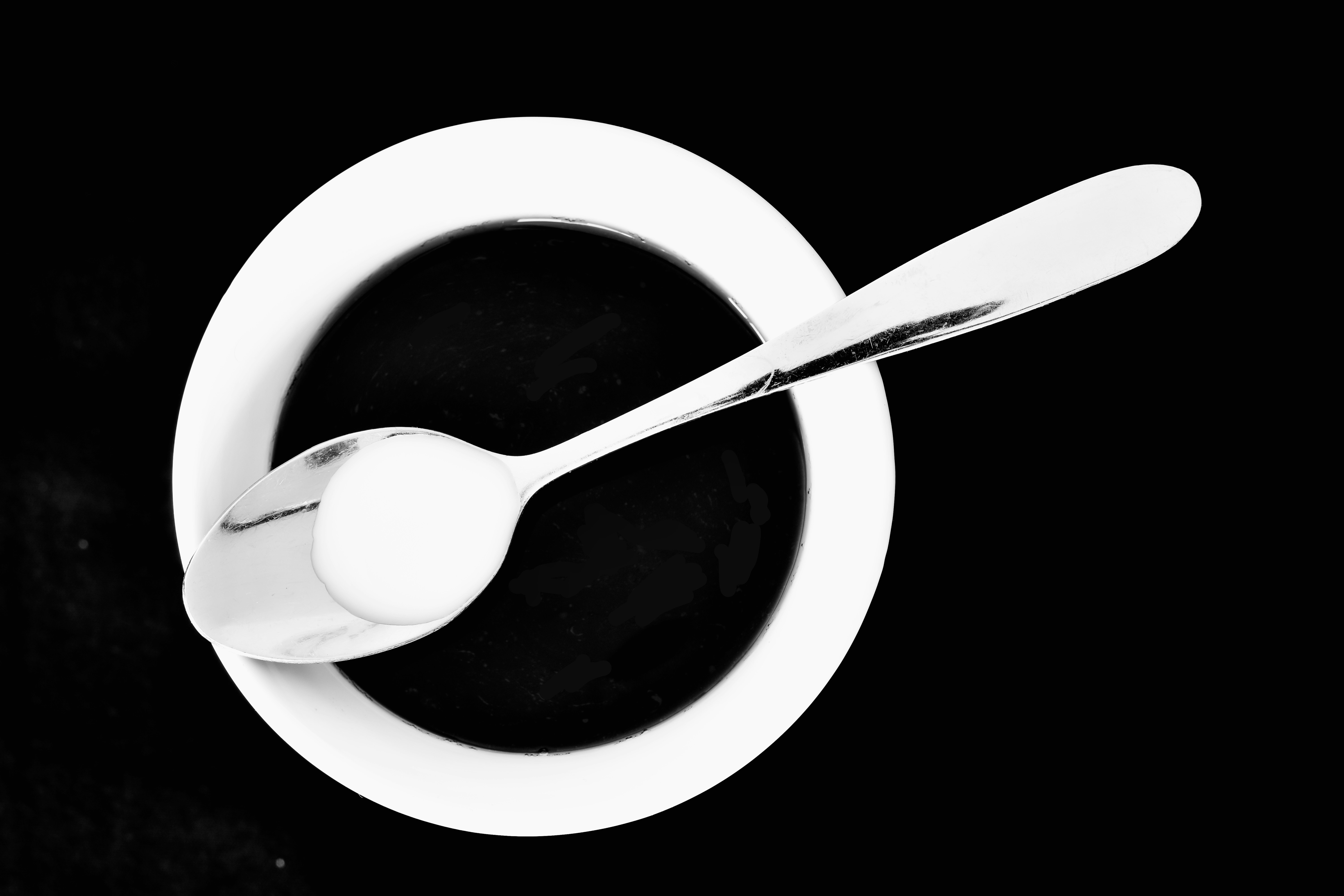 Minimalist Spoon and Cup in Monochrome Emptiness