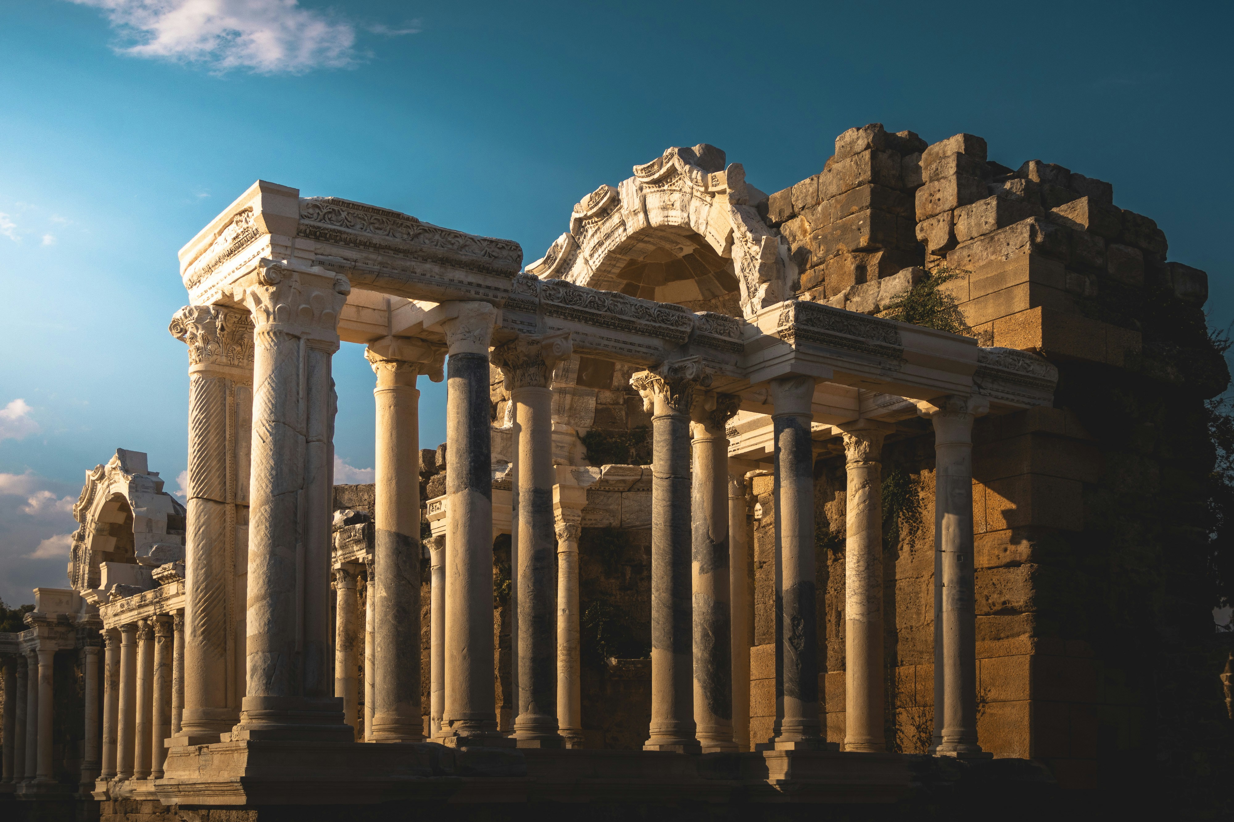 Ruined Columns Under a Medieval-Blue Sky