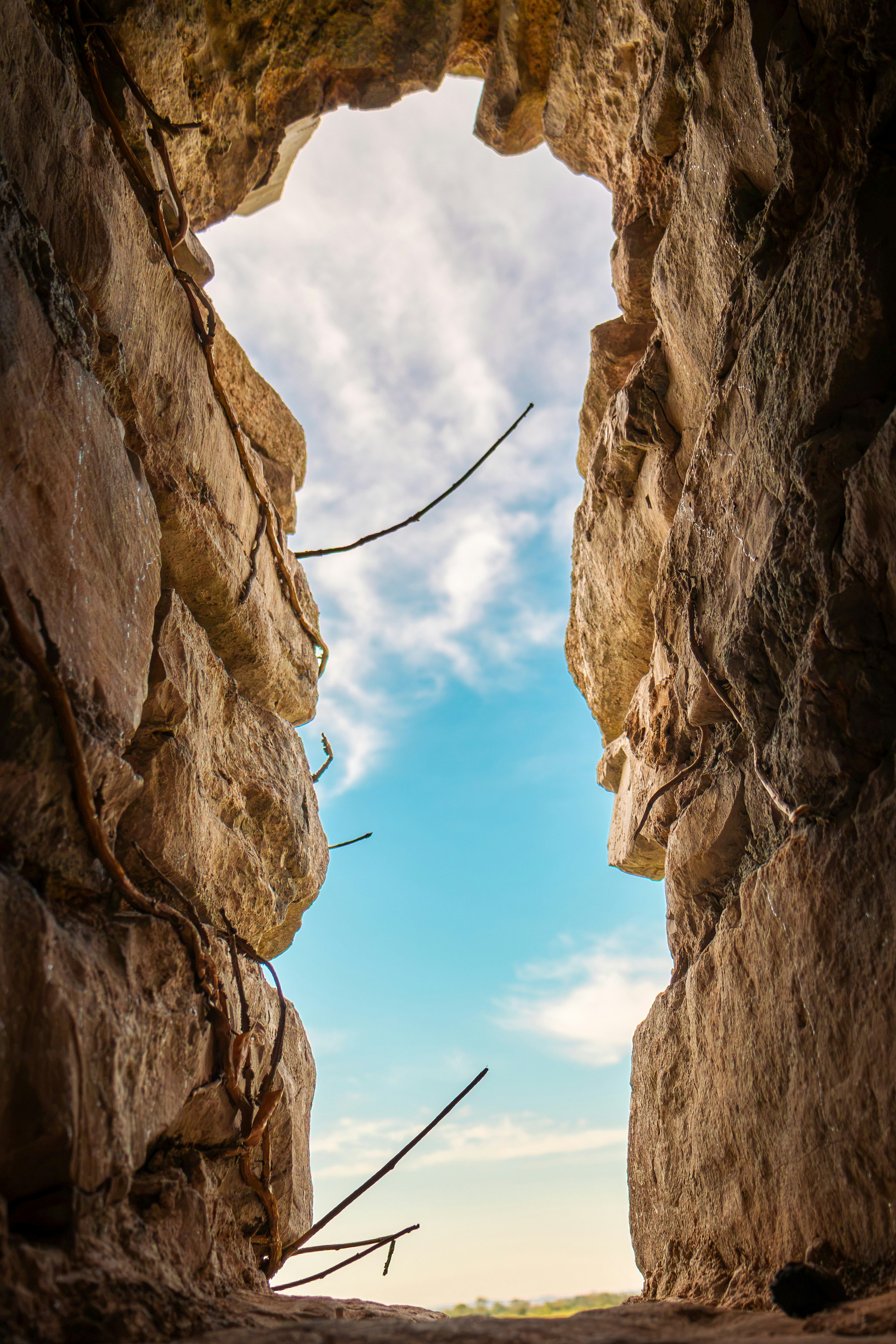 Sky Between Giants: A Narrow Canyon Opens to Blue Light