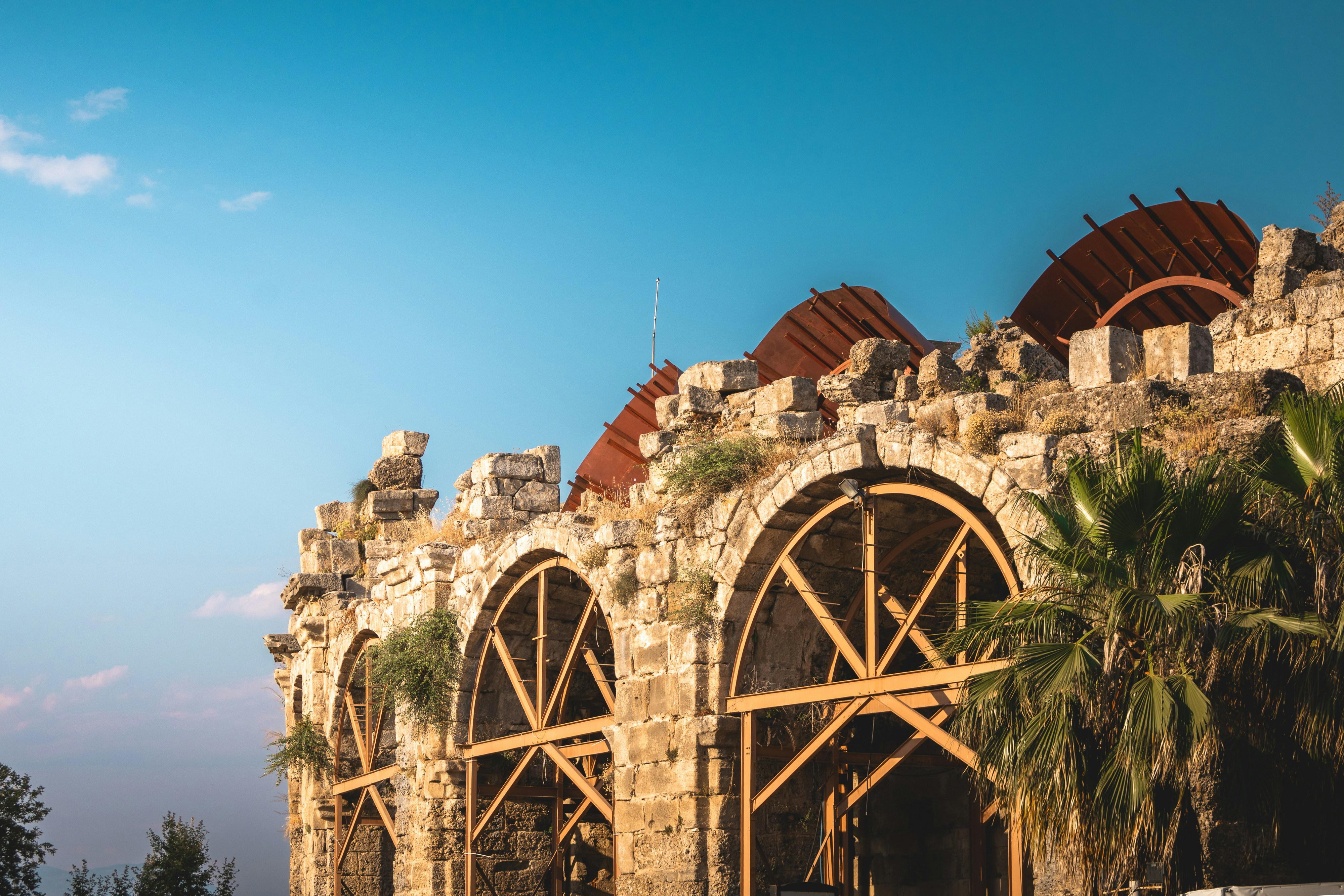 Ancient arches under a clear blue sky