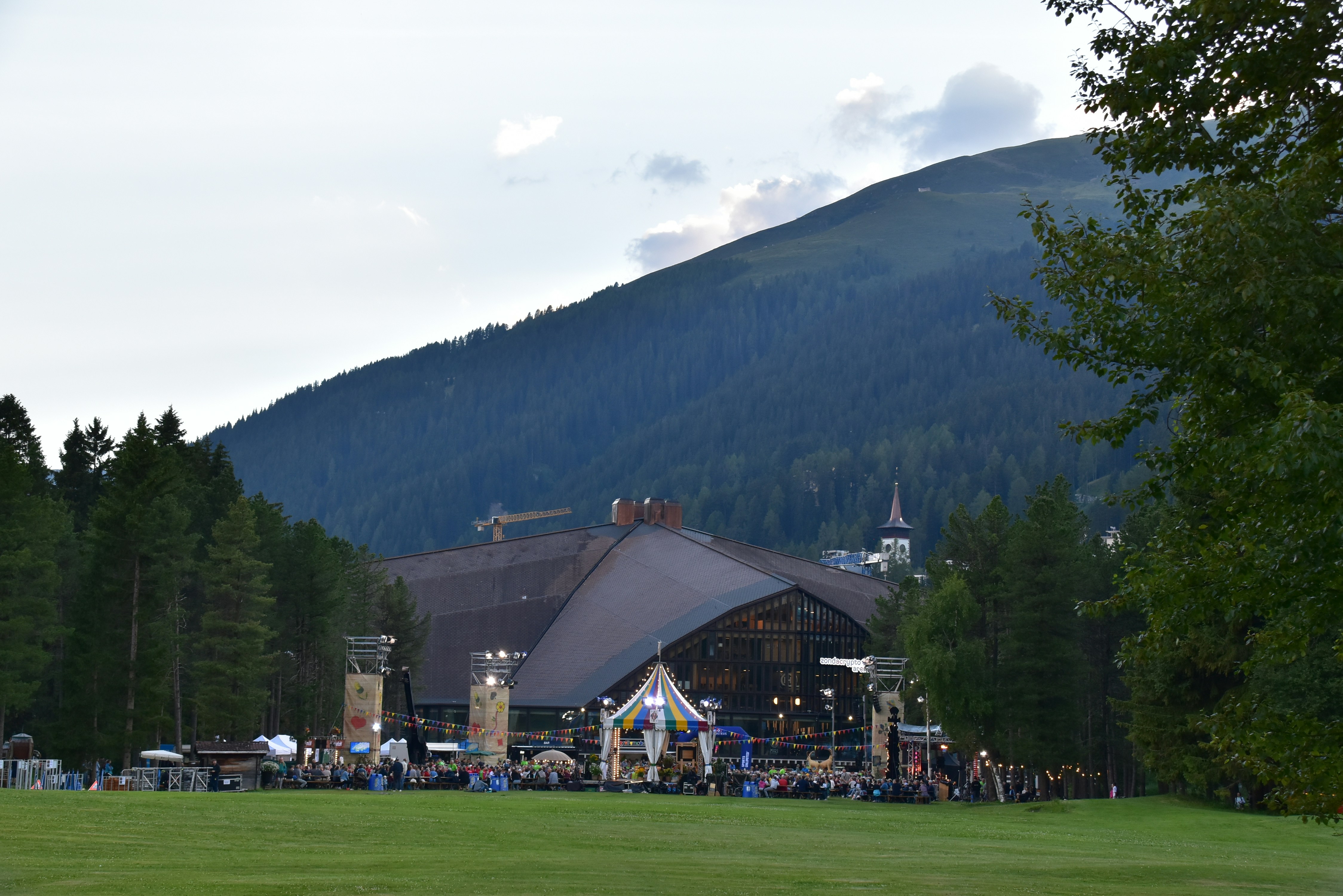 Concert Under the Pines: A Mountain Festival at Dusk