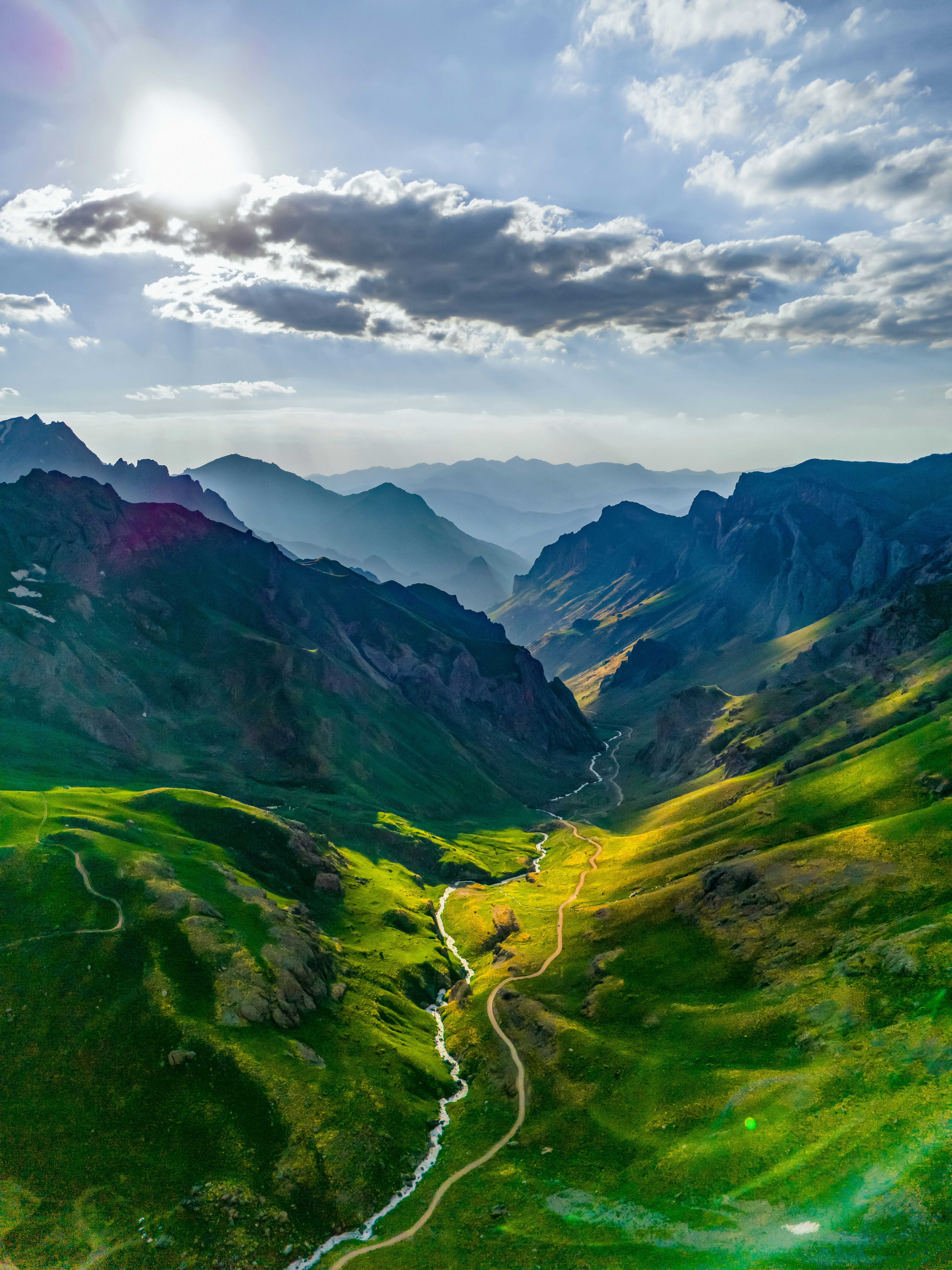 Vaporous Peaks: A Valleys and River Carve the Light