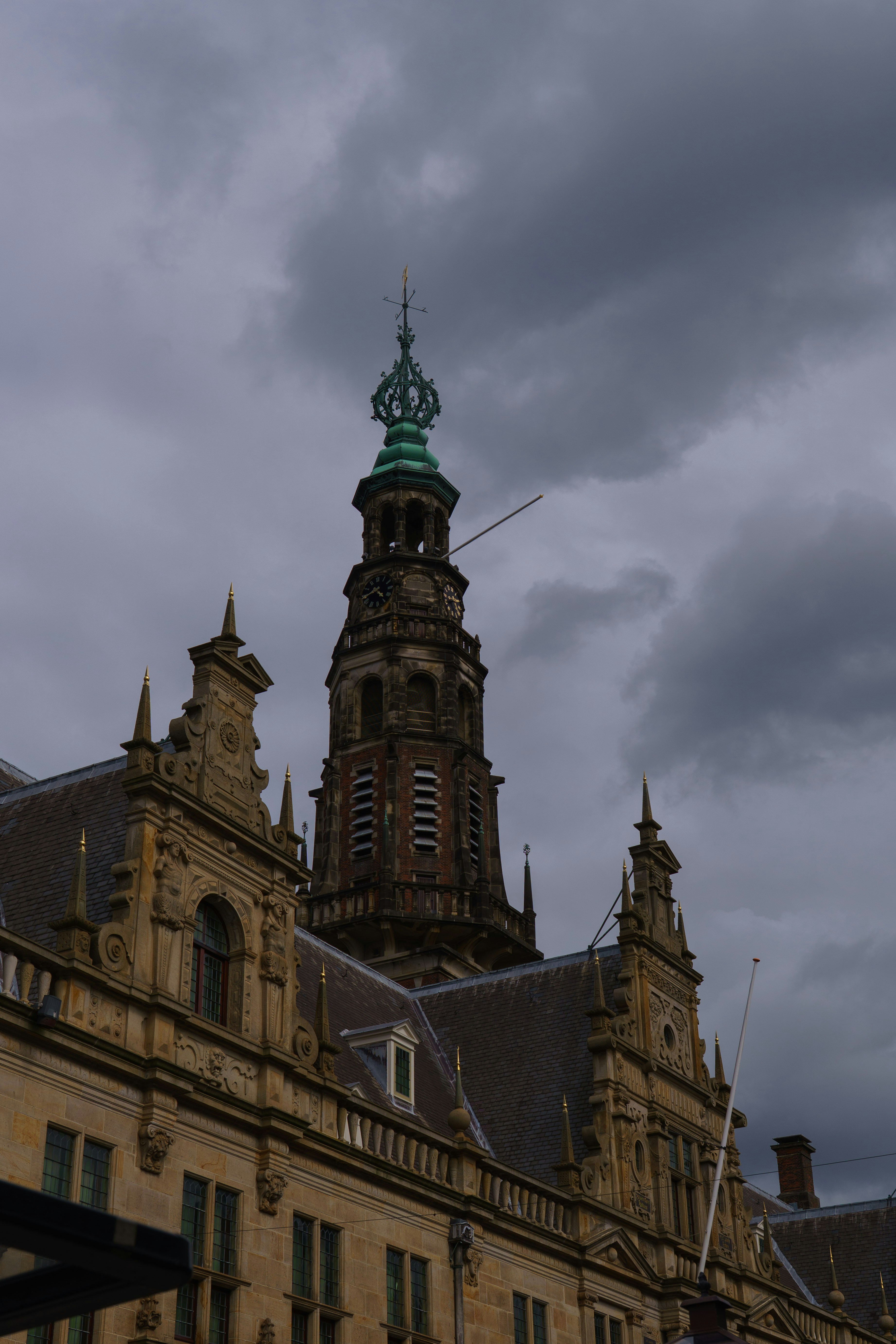 Gothic Clocktower Silhouetted Against Stormy Sky