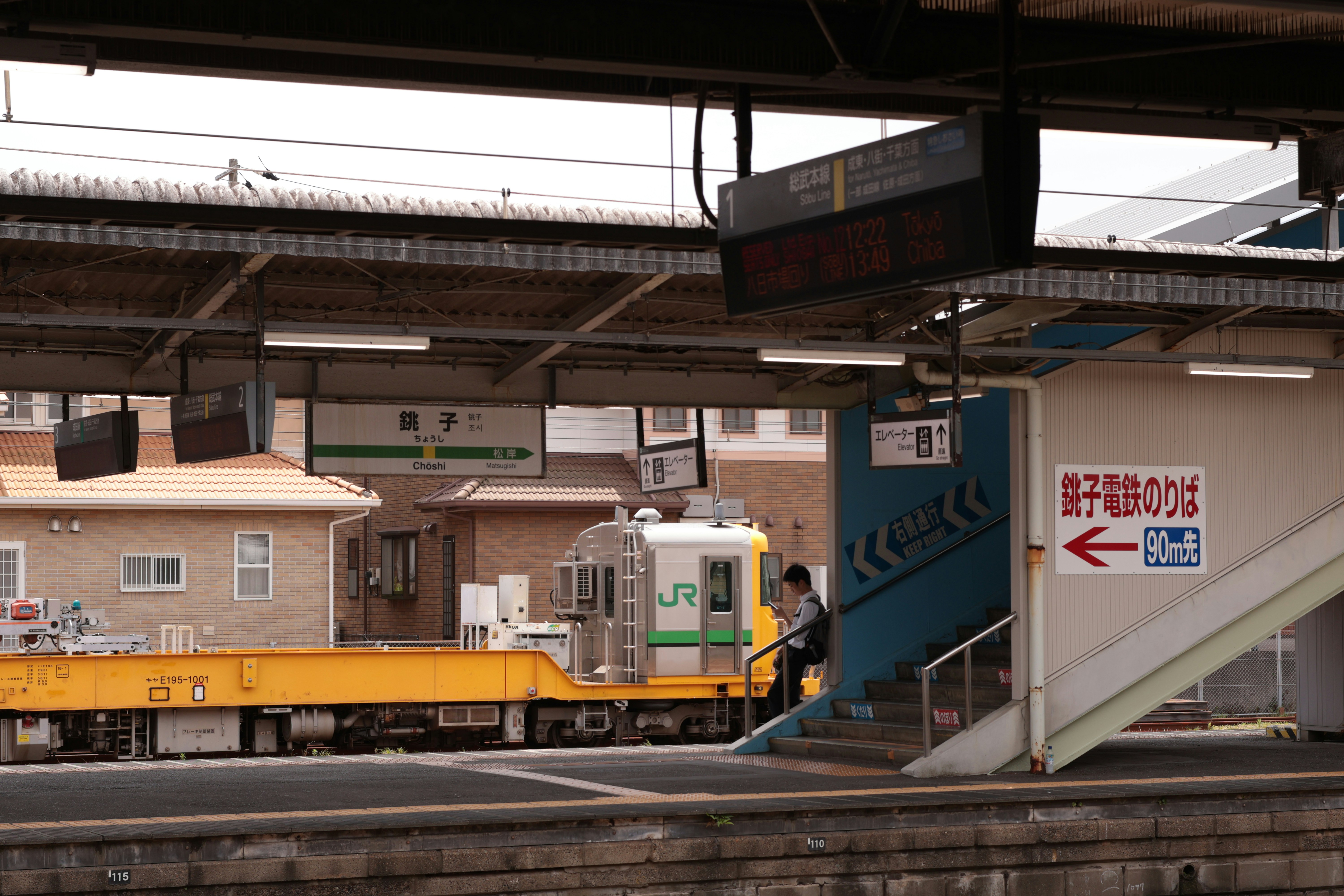 Quiet Platform, Moving Metal: A JR Station Moment at Dawn