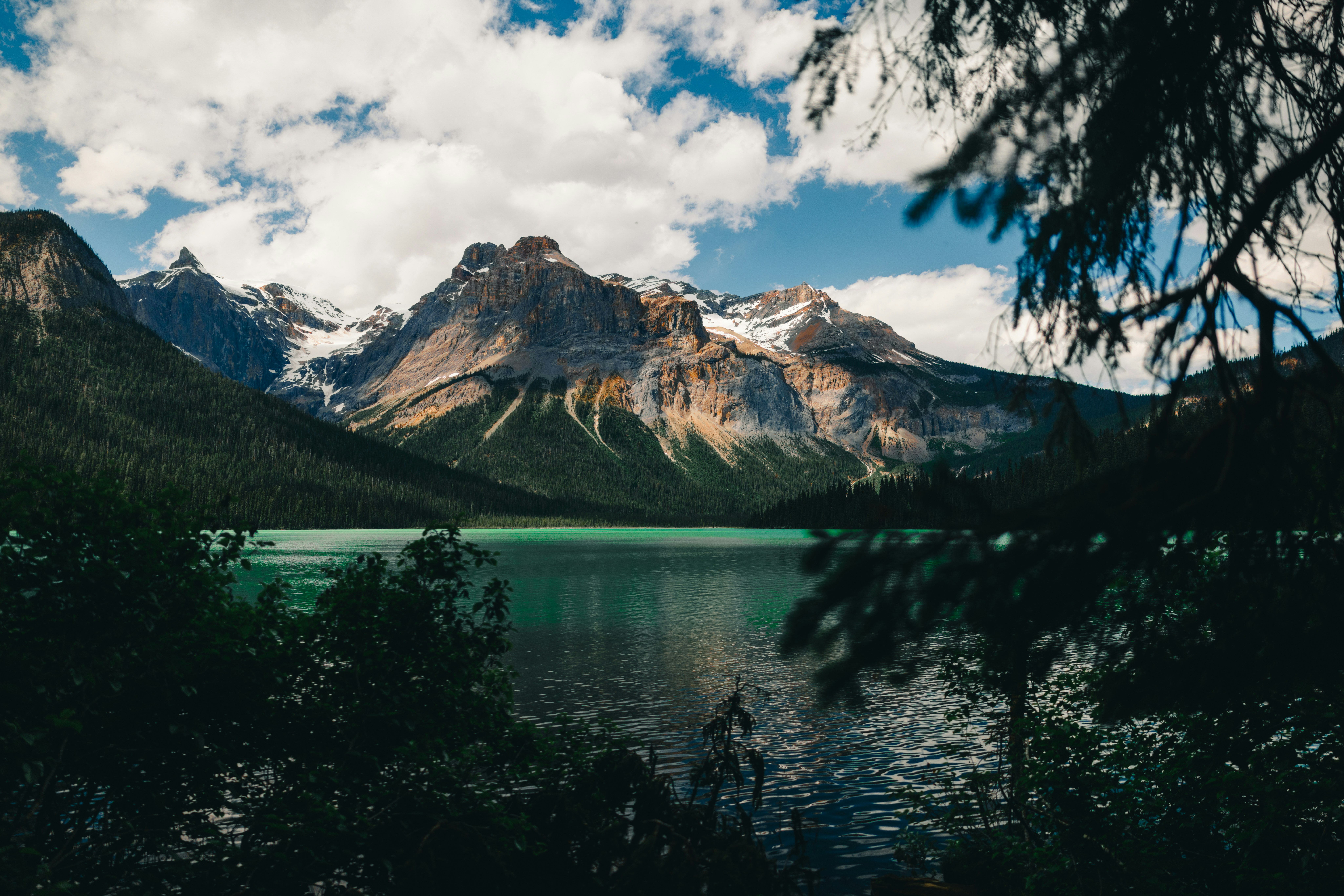 Azure Gate: Mountain Lake Under a Framed Sky