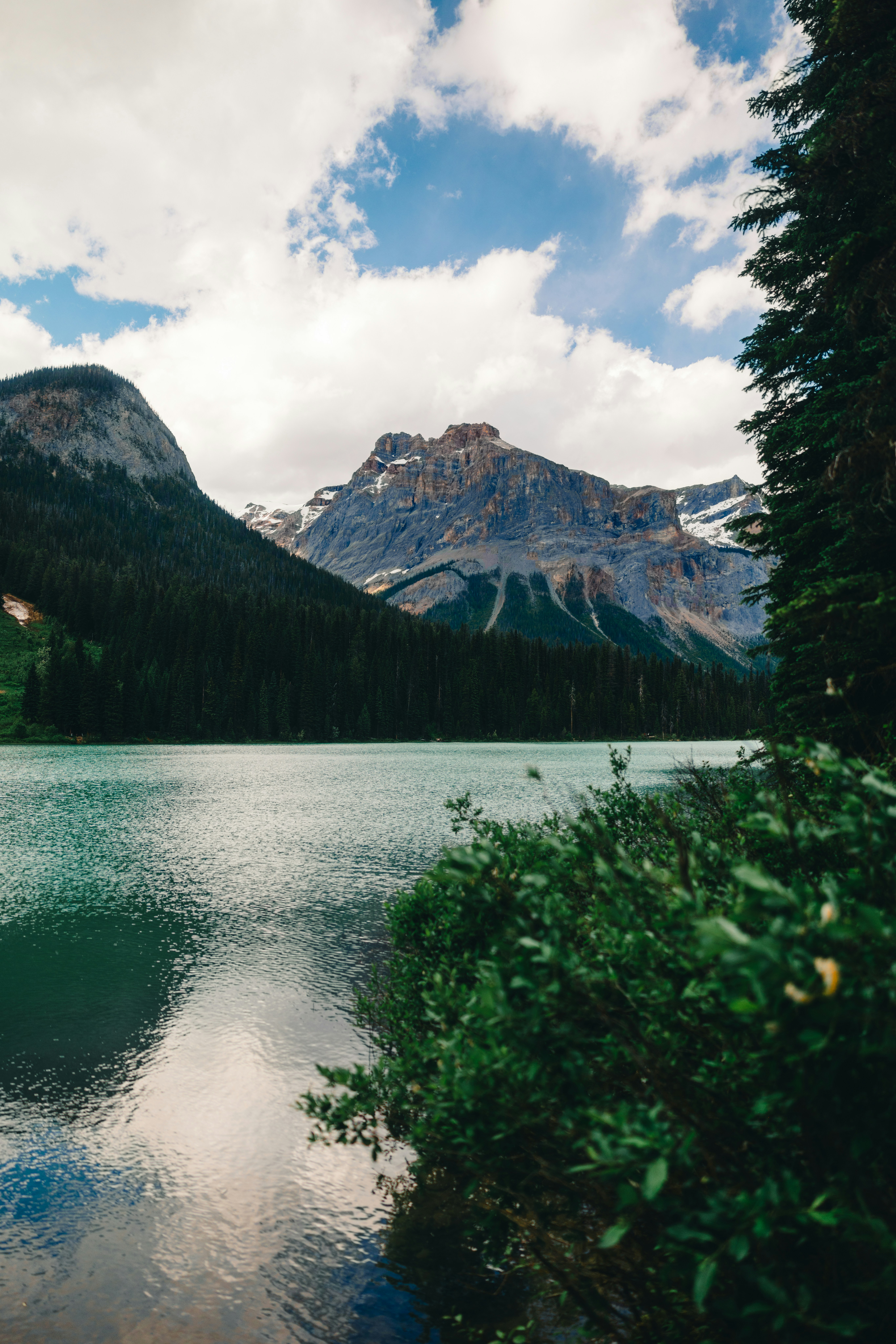 Emerald Lake Against Snow-Crowned Peaks