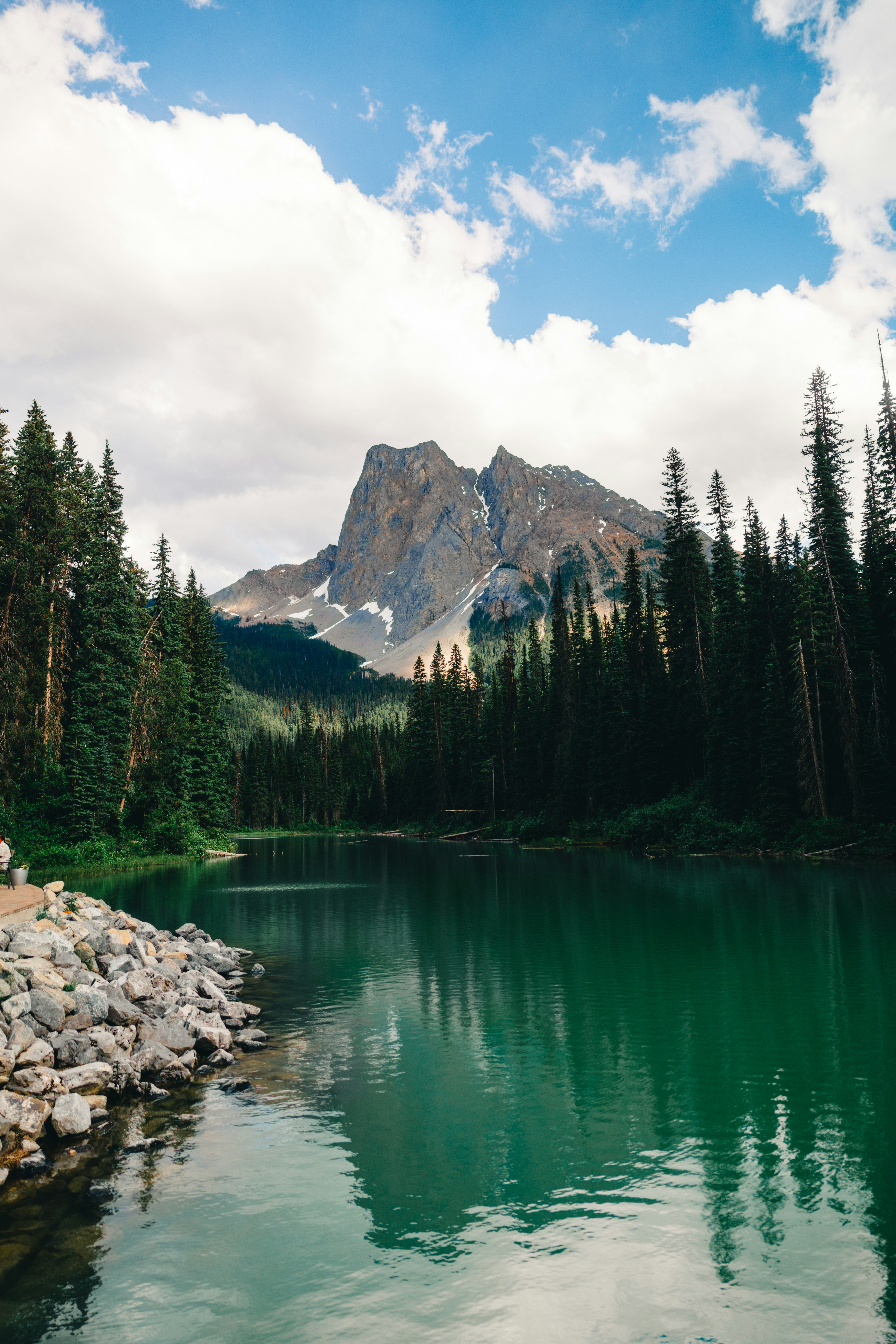Emerald Lake with Alpine Peak Reflected in Calm Waters