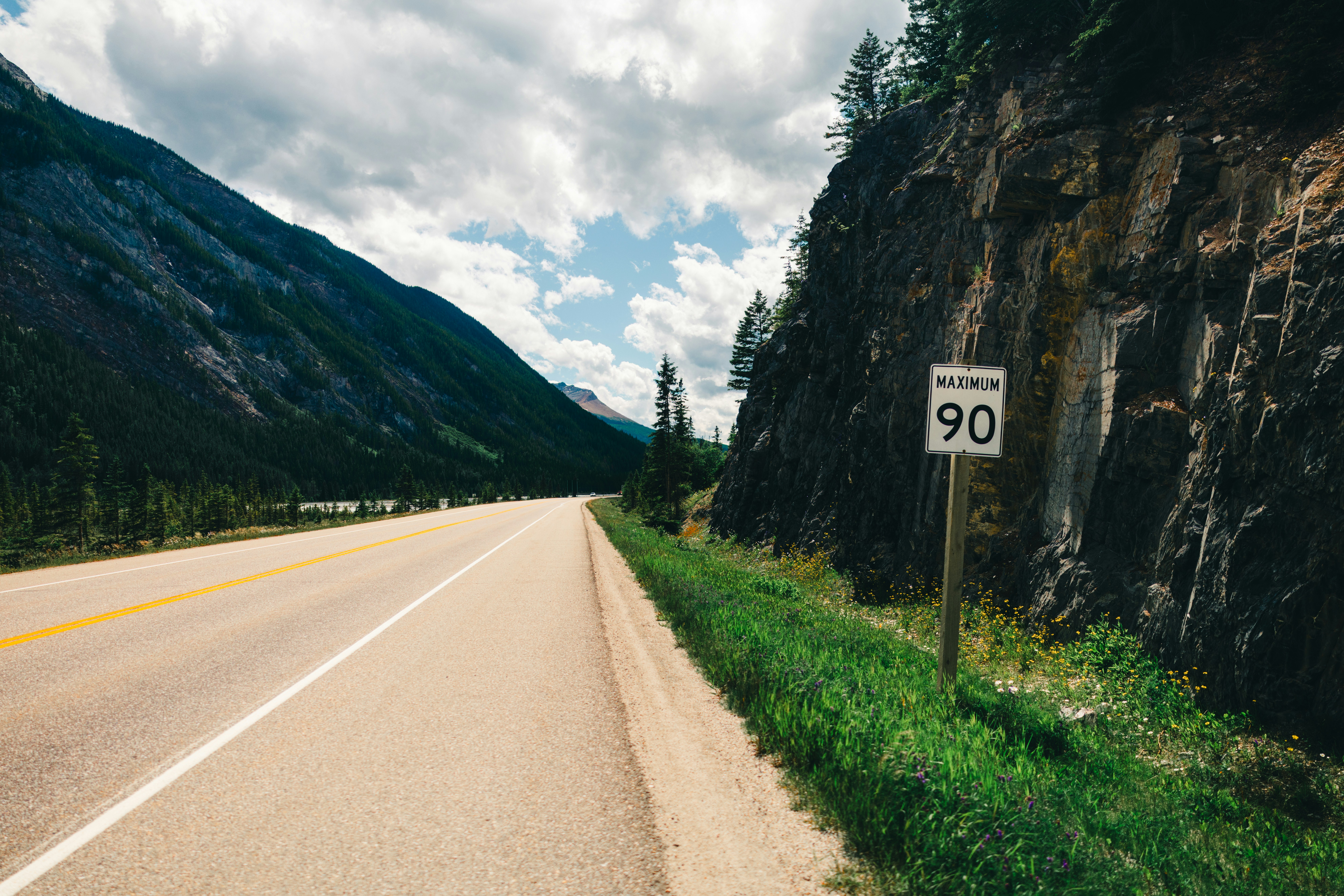 Highway through a Canyon: Quiet Descent Beneath Rock Faces