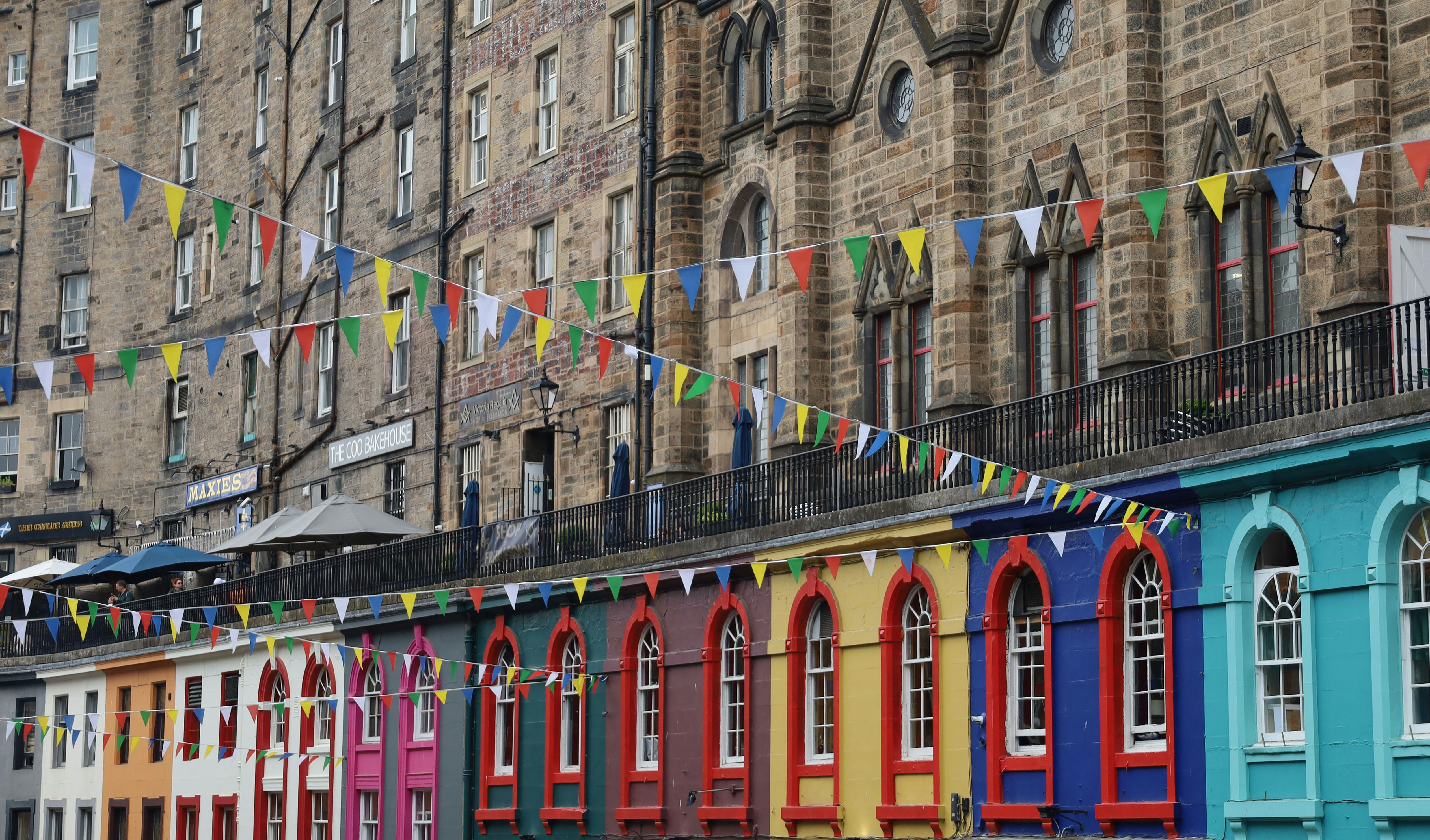Colorful Row of Townhouses under Festive Bunting