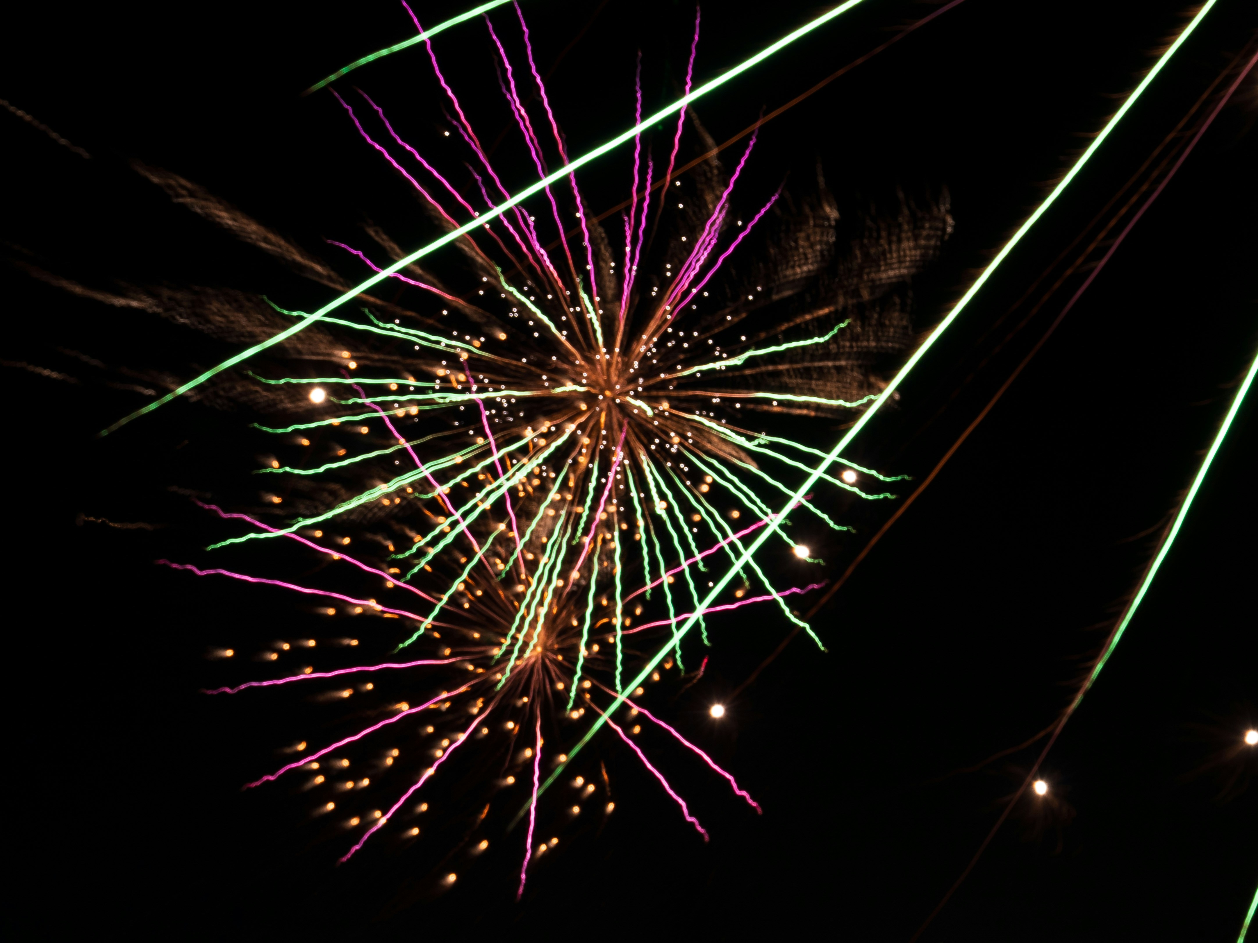 Firework Mosaic: Multicolored Radiance Against Night