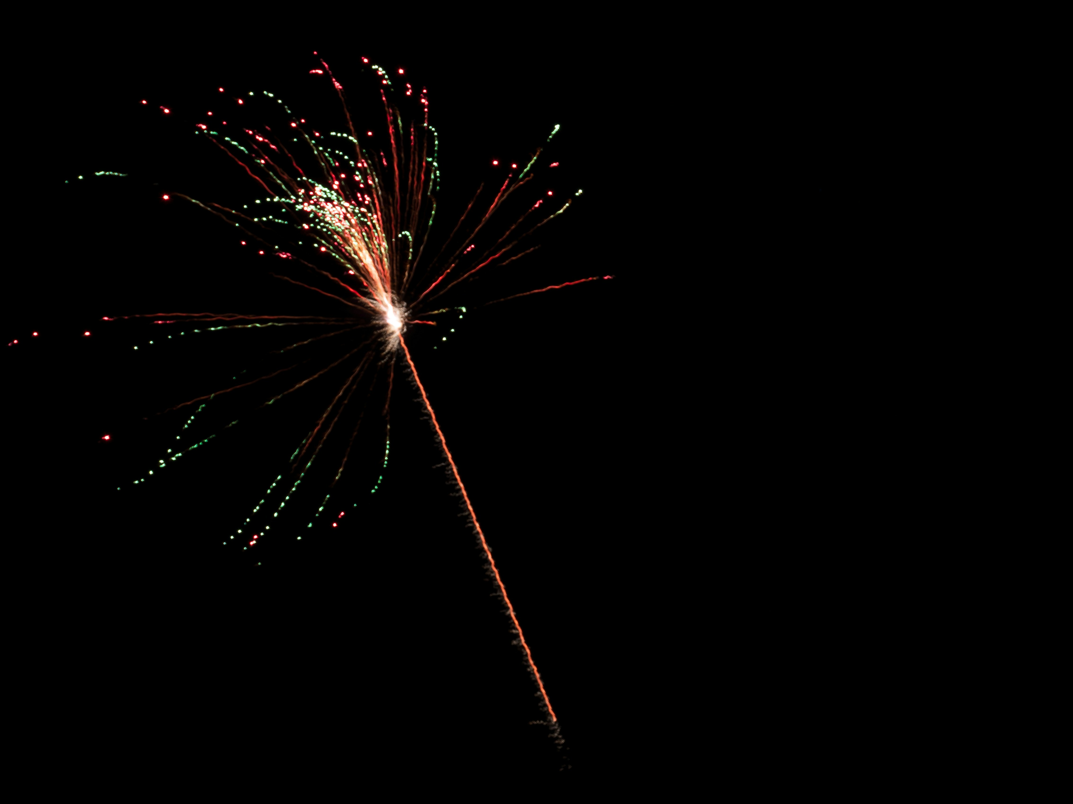 Night Bloom: Fireworks Burst from a Lone Pyro
