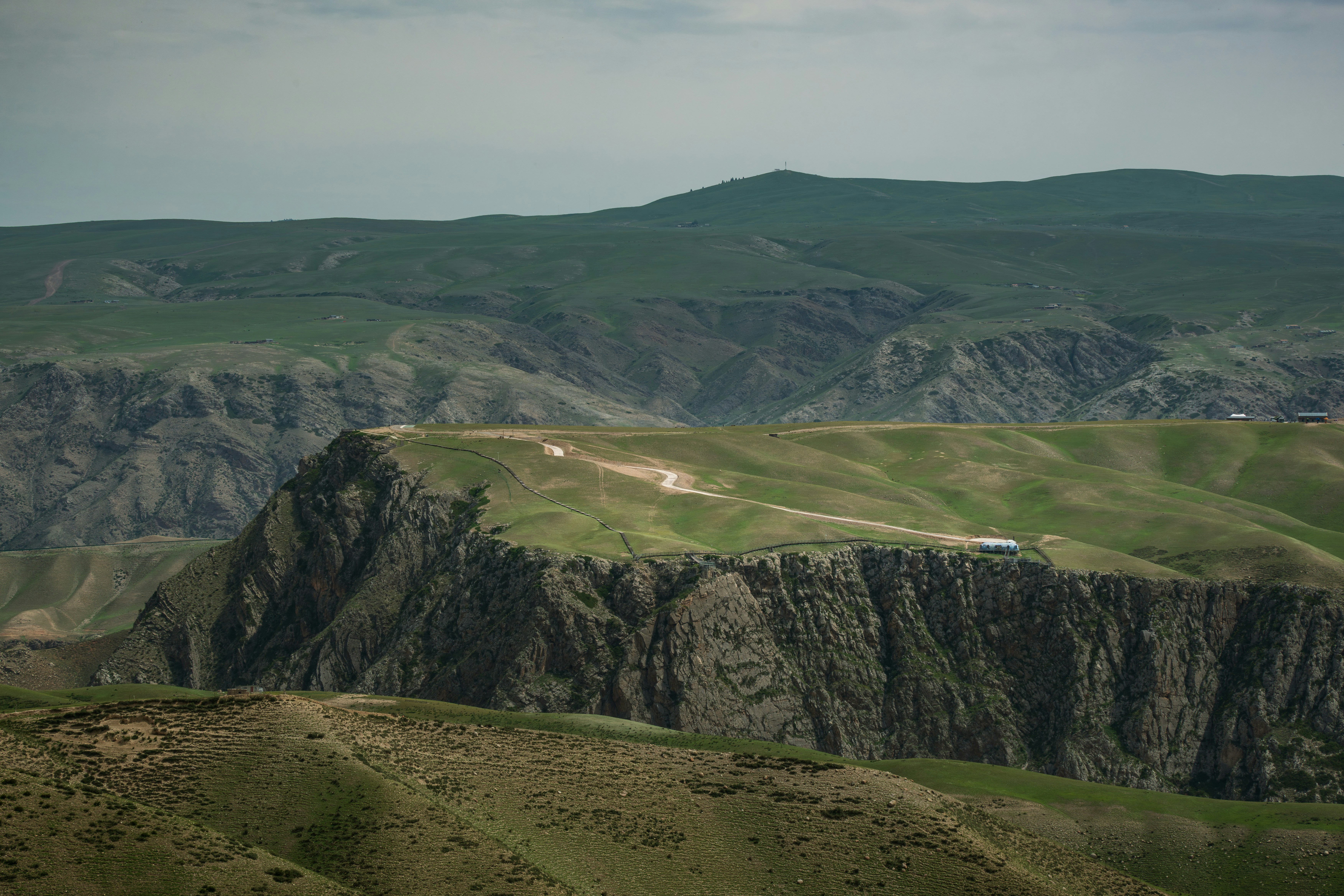 Edge of the Crested Plateau: A Quiet Rift Across Rolling Hills