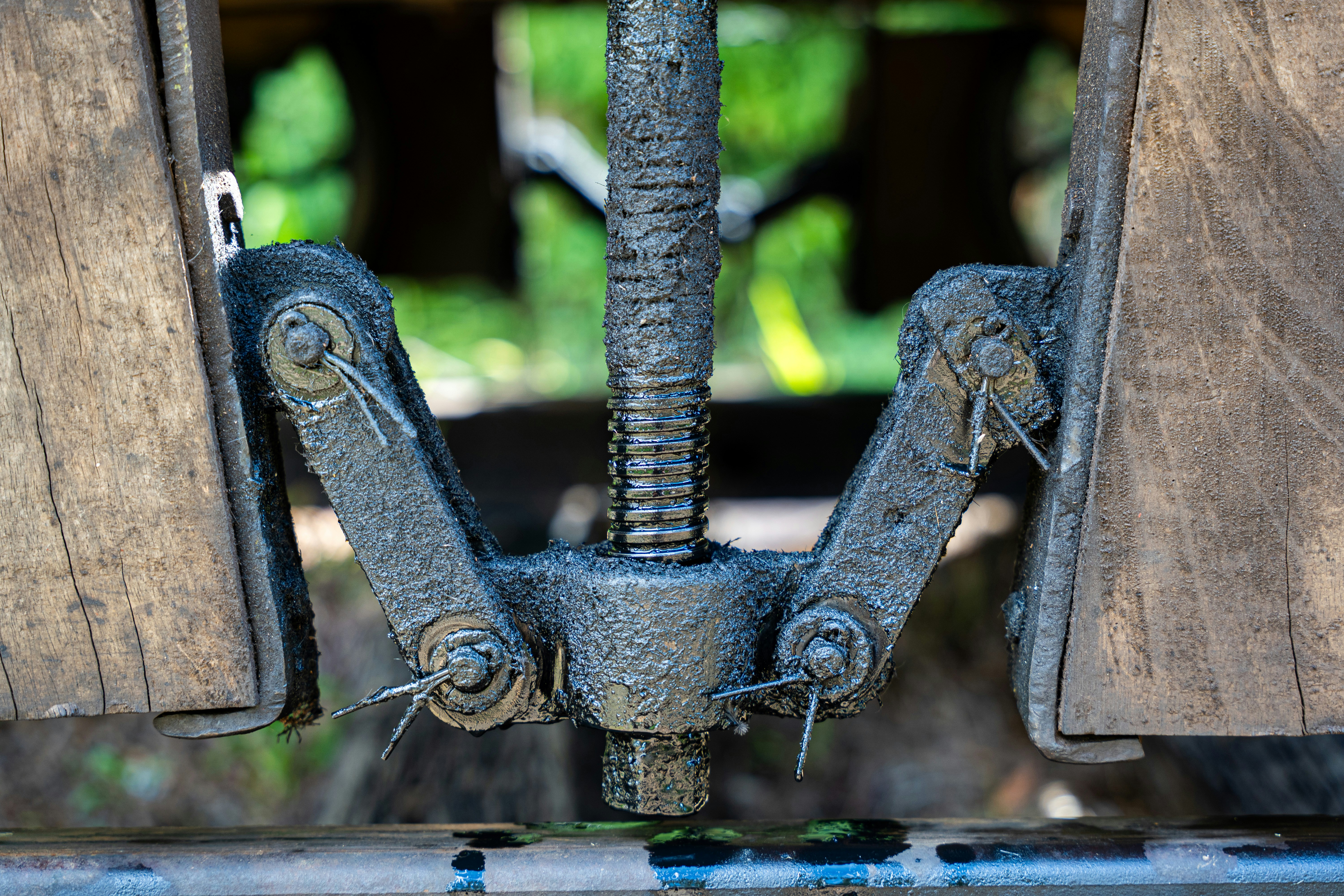 Creaking Coupler Under Load: A Close-Up on Weathered Mechanical Links