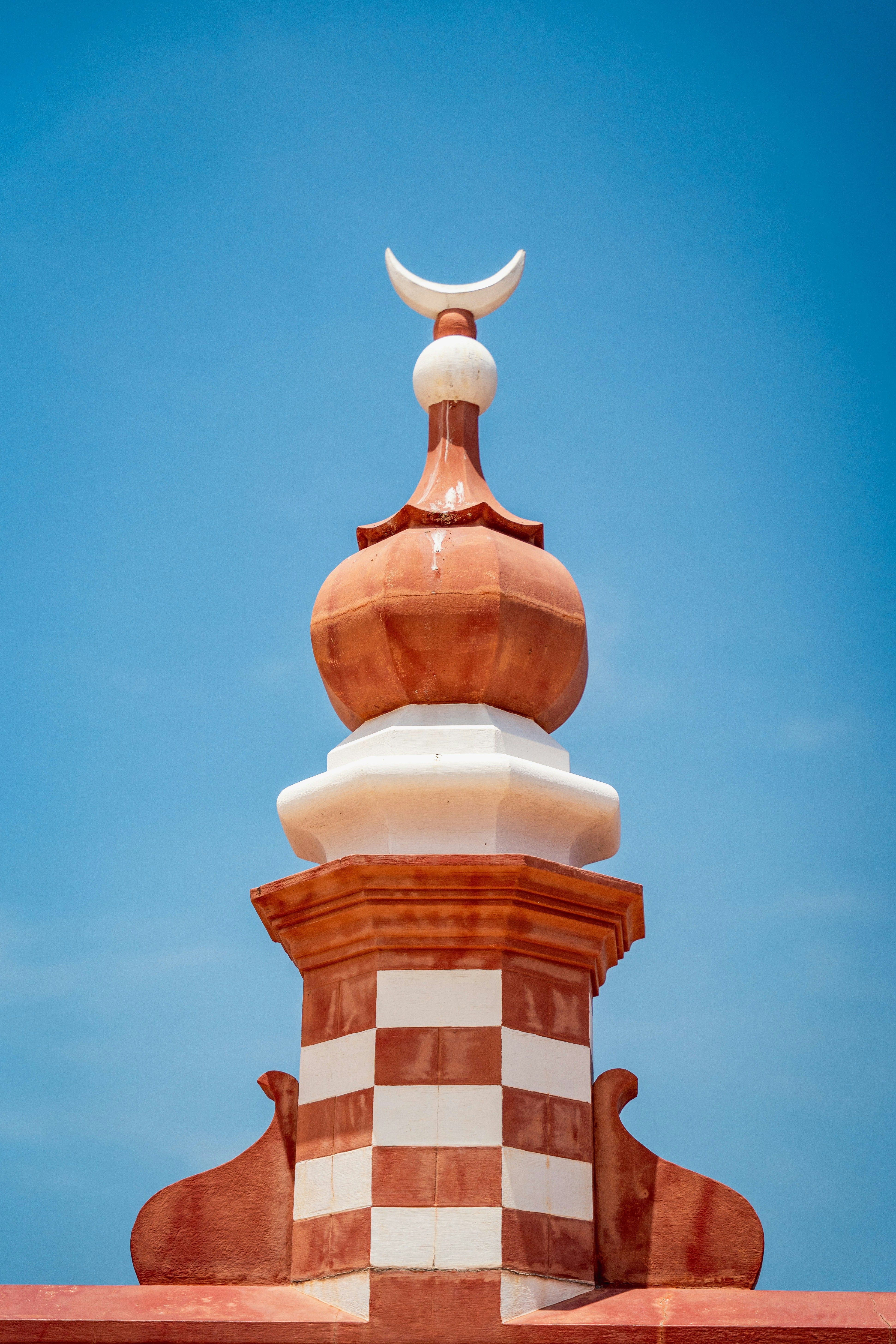 Capped in Cerulean Sky: The Tiered Spire