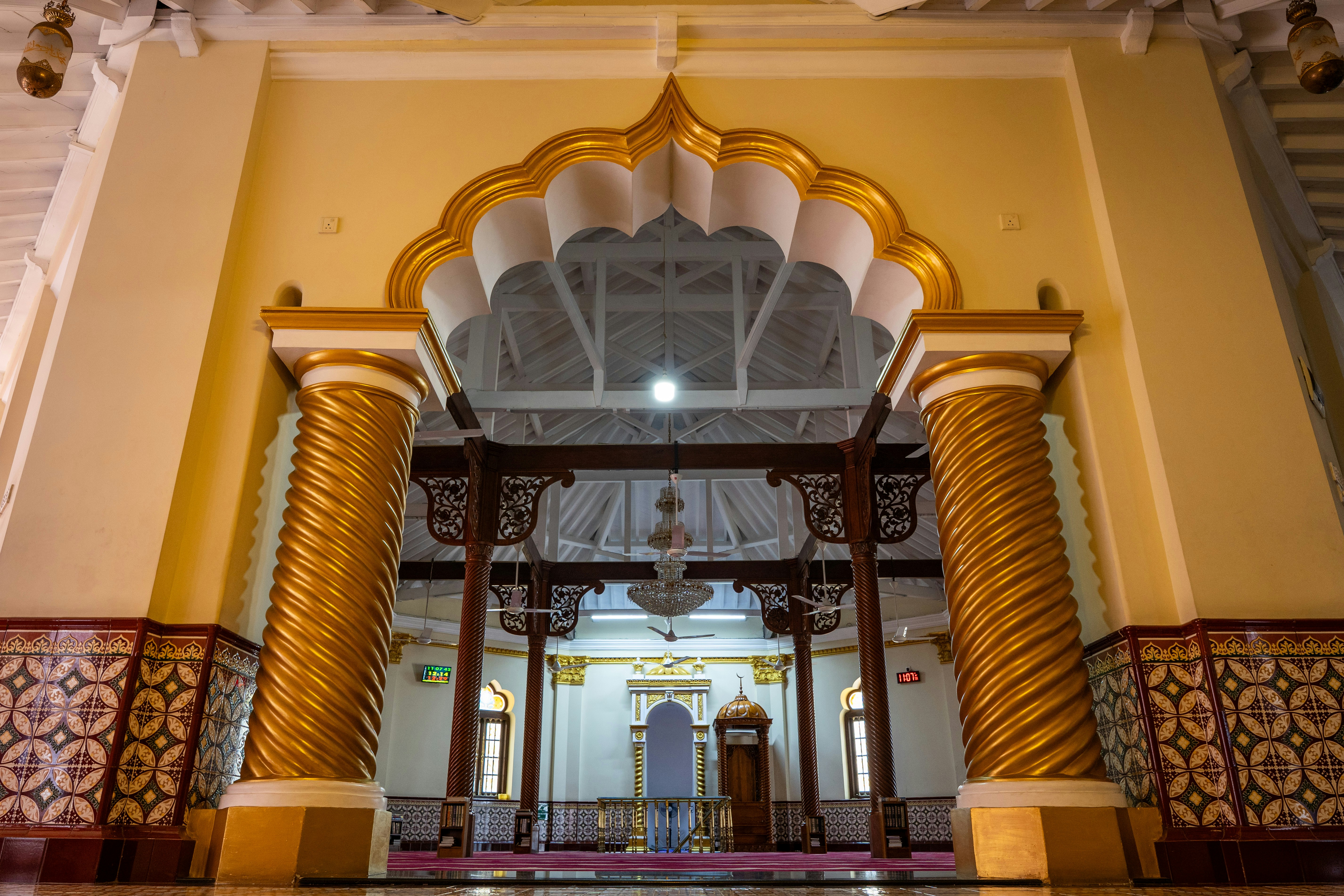 Sacred Archways: A Dim Corridor into Reverent Light