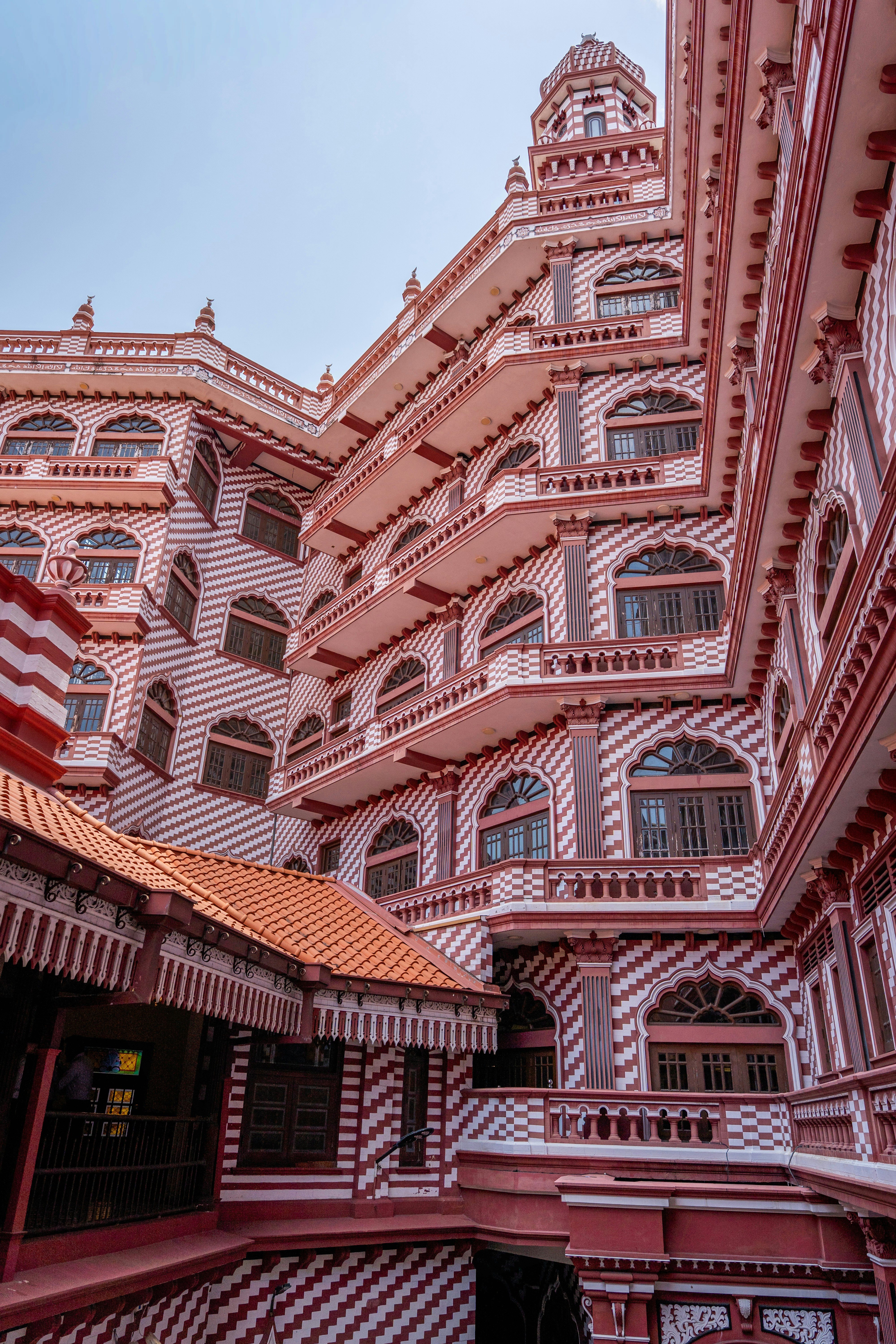 Red-and-White Facade Cascade: A Geometric Dwelling in Perspective