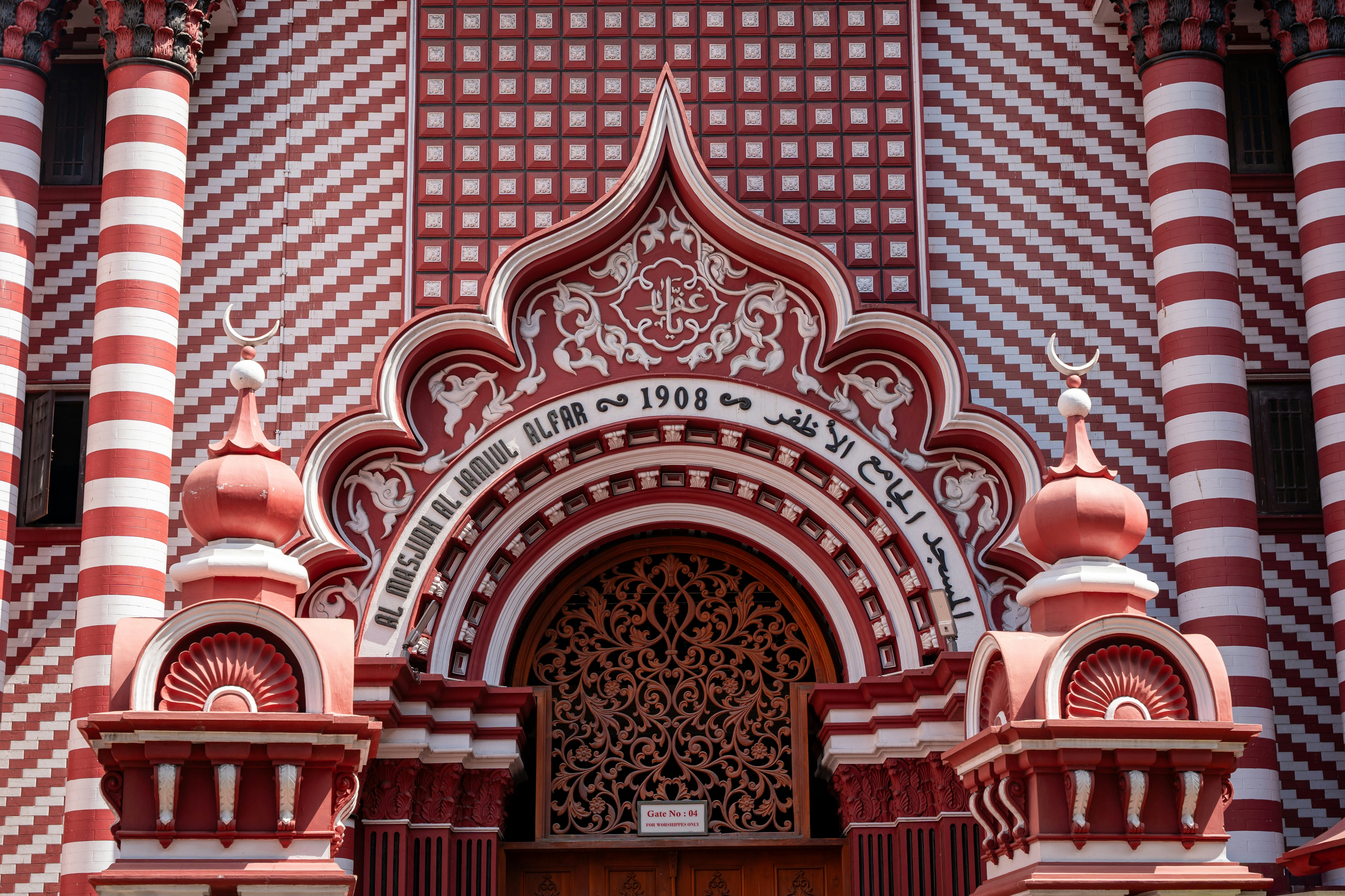 Archways of Crimson Craft: The Gatekeeper’s Carved Door
