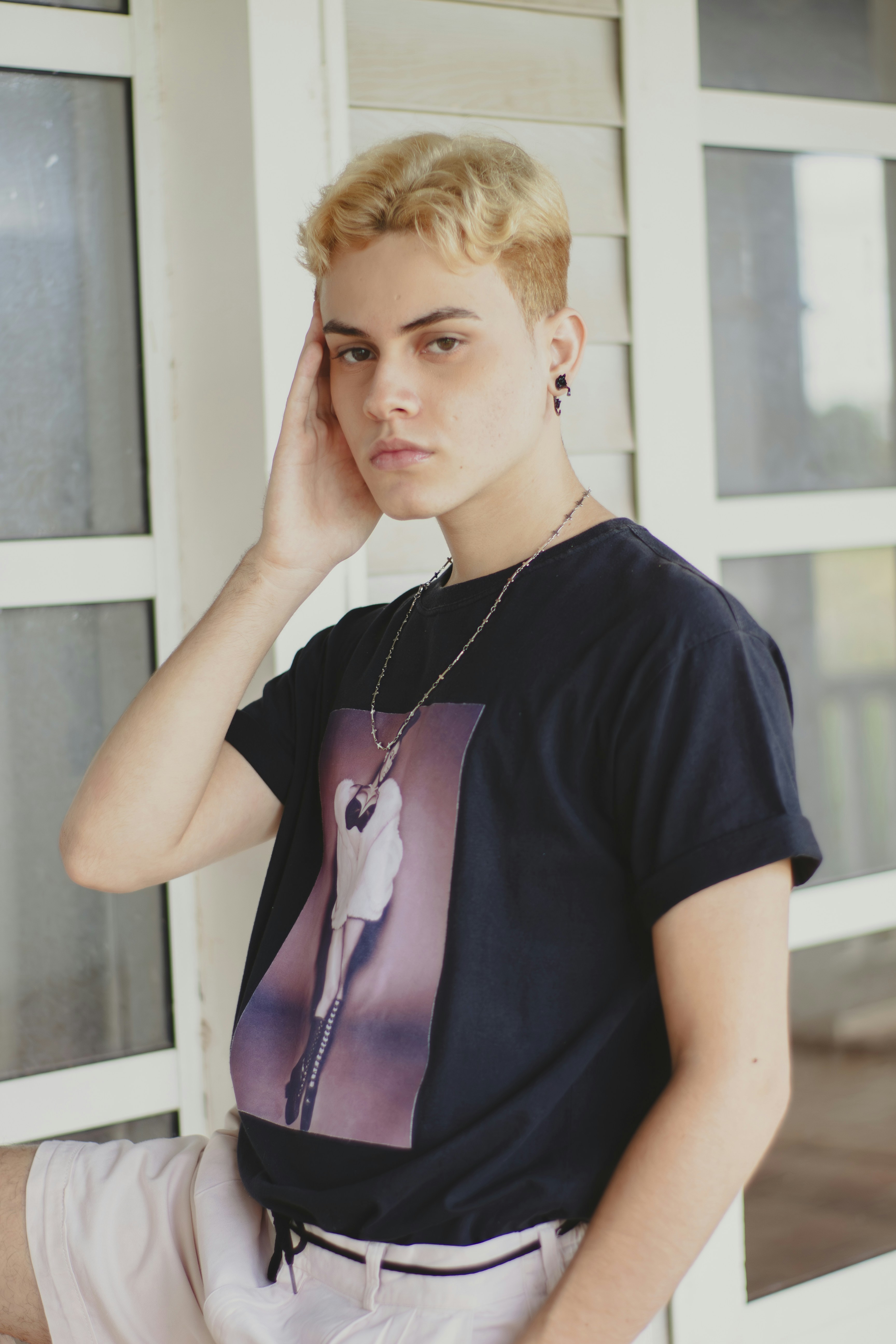 Blonde Hair, Quiet Confidence: Portrait on the Porch