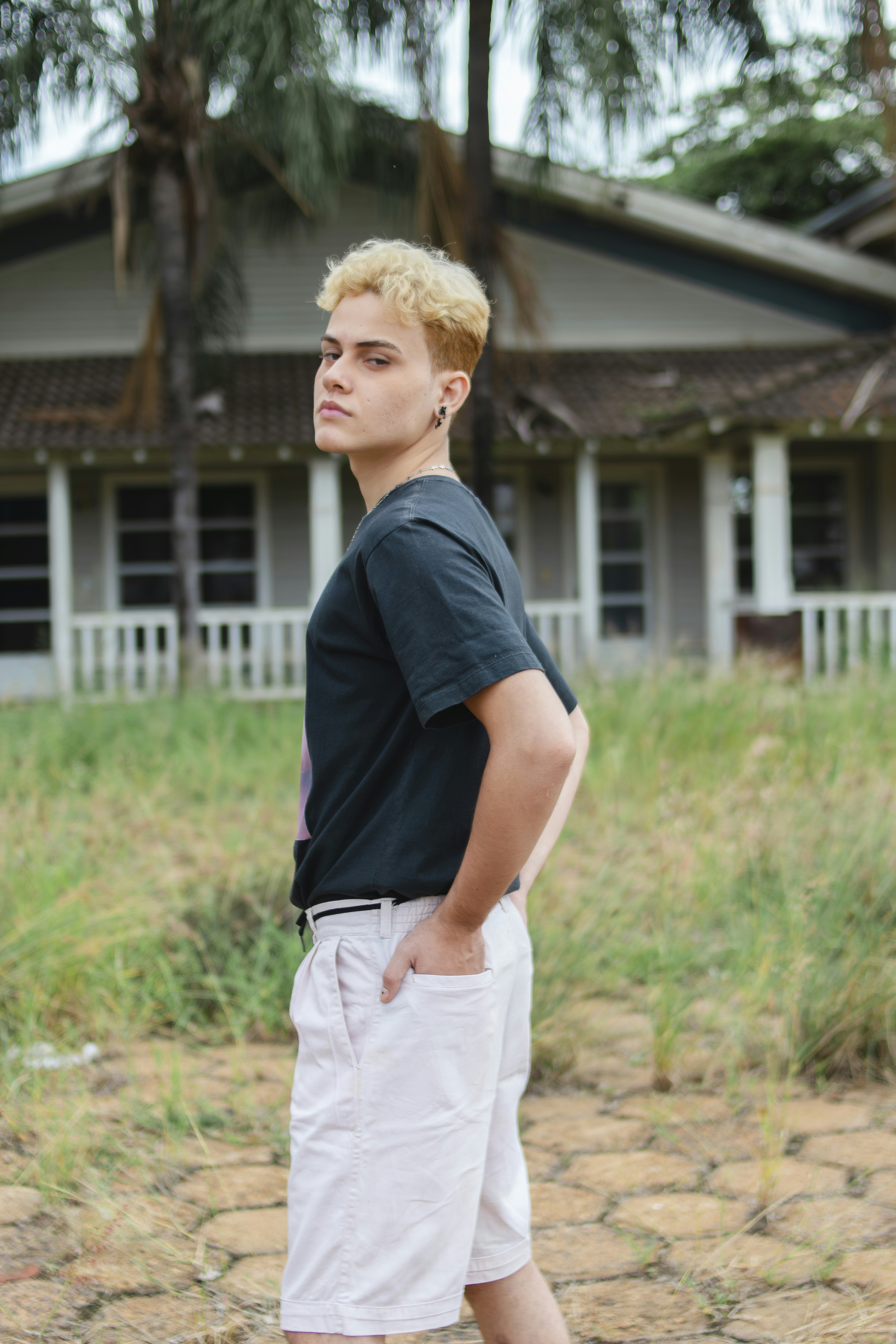 Quiet Confidence: A Teen Portrait in Soft Focus Against a Suburban Backdrop