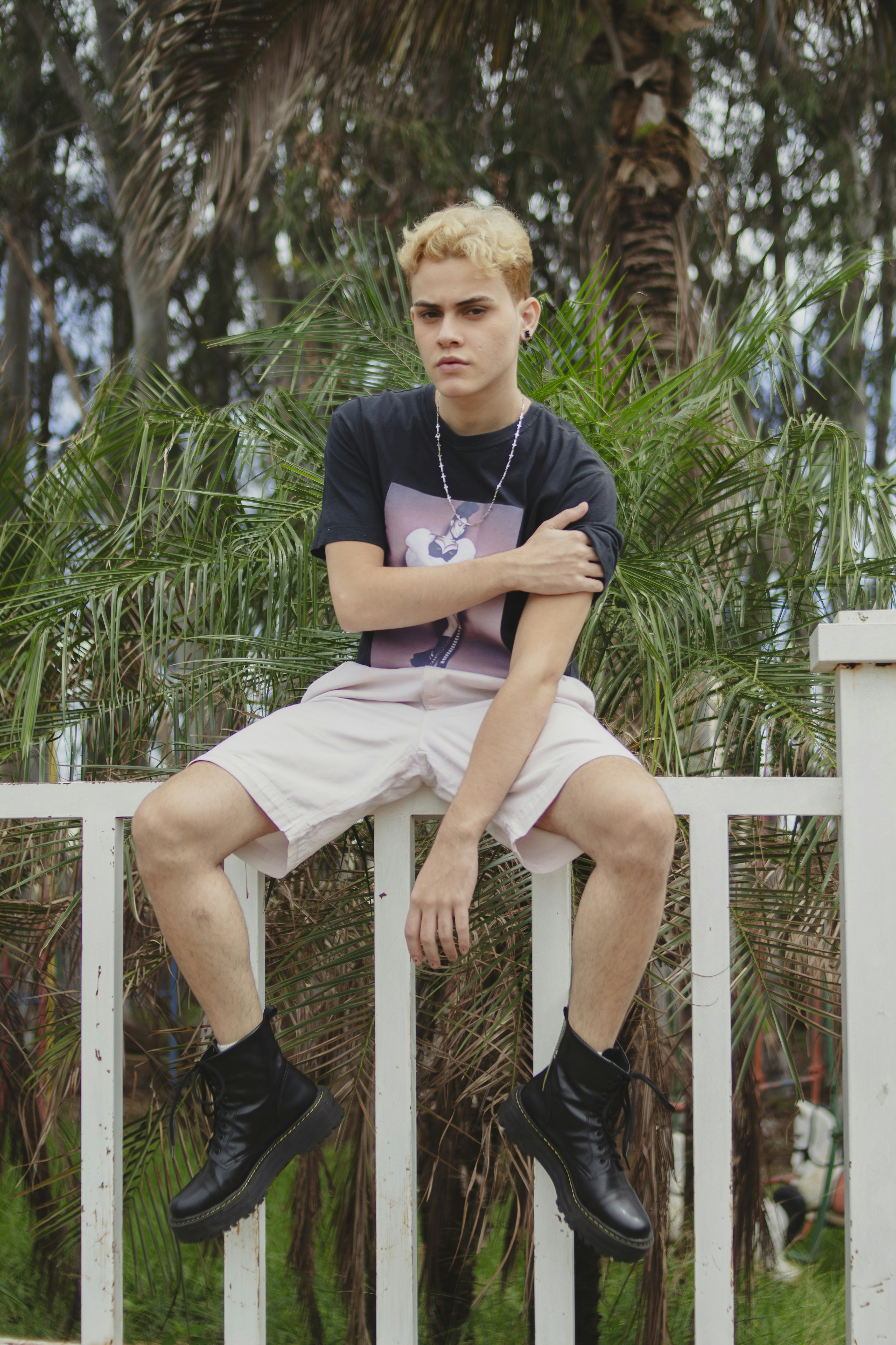 Youthful Stance: Centered Confidence in a Sunny Garden