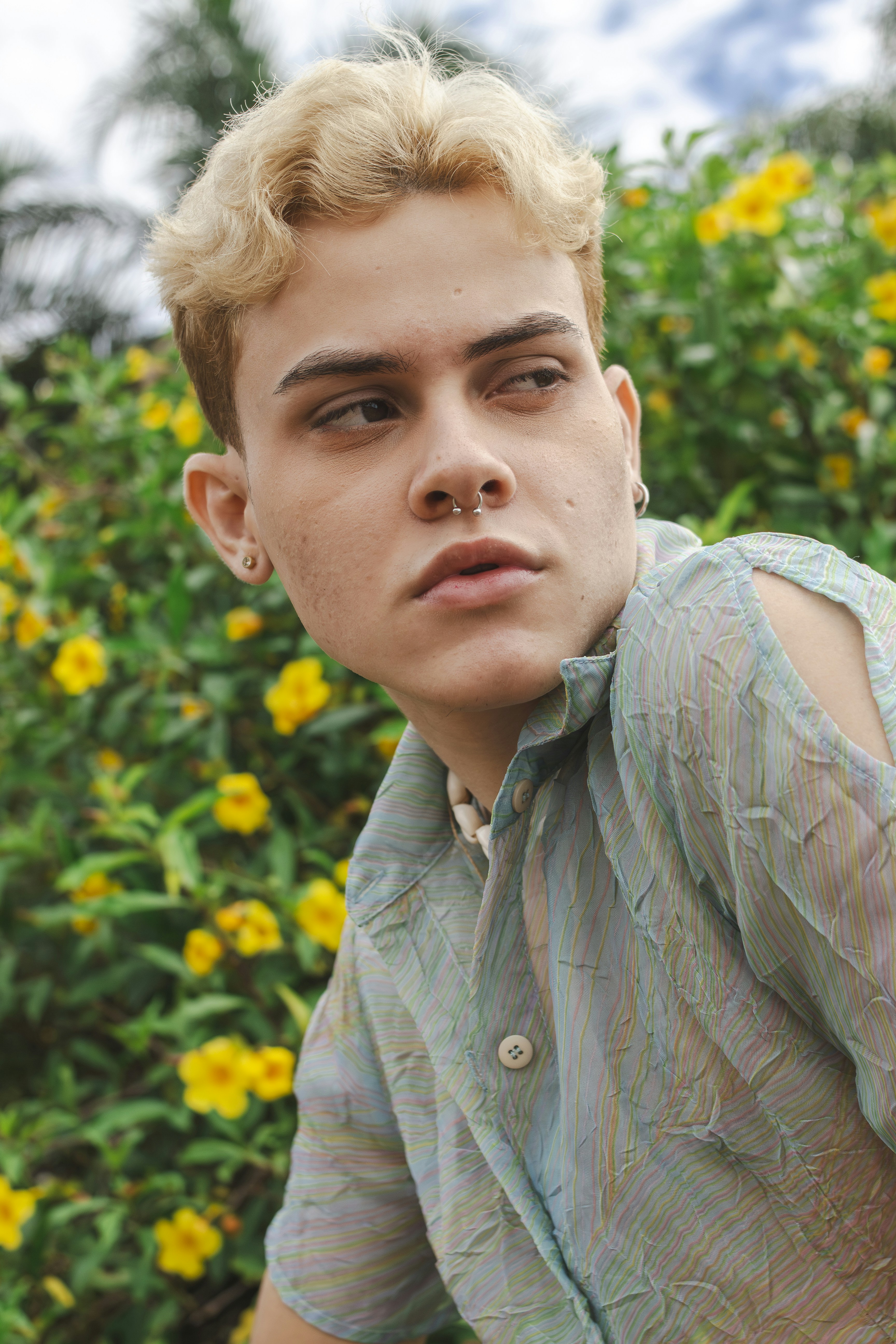 Soft Light and Bold Color: A Portrait Among Yellow Blooms