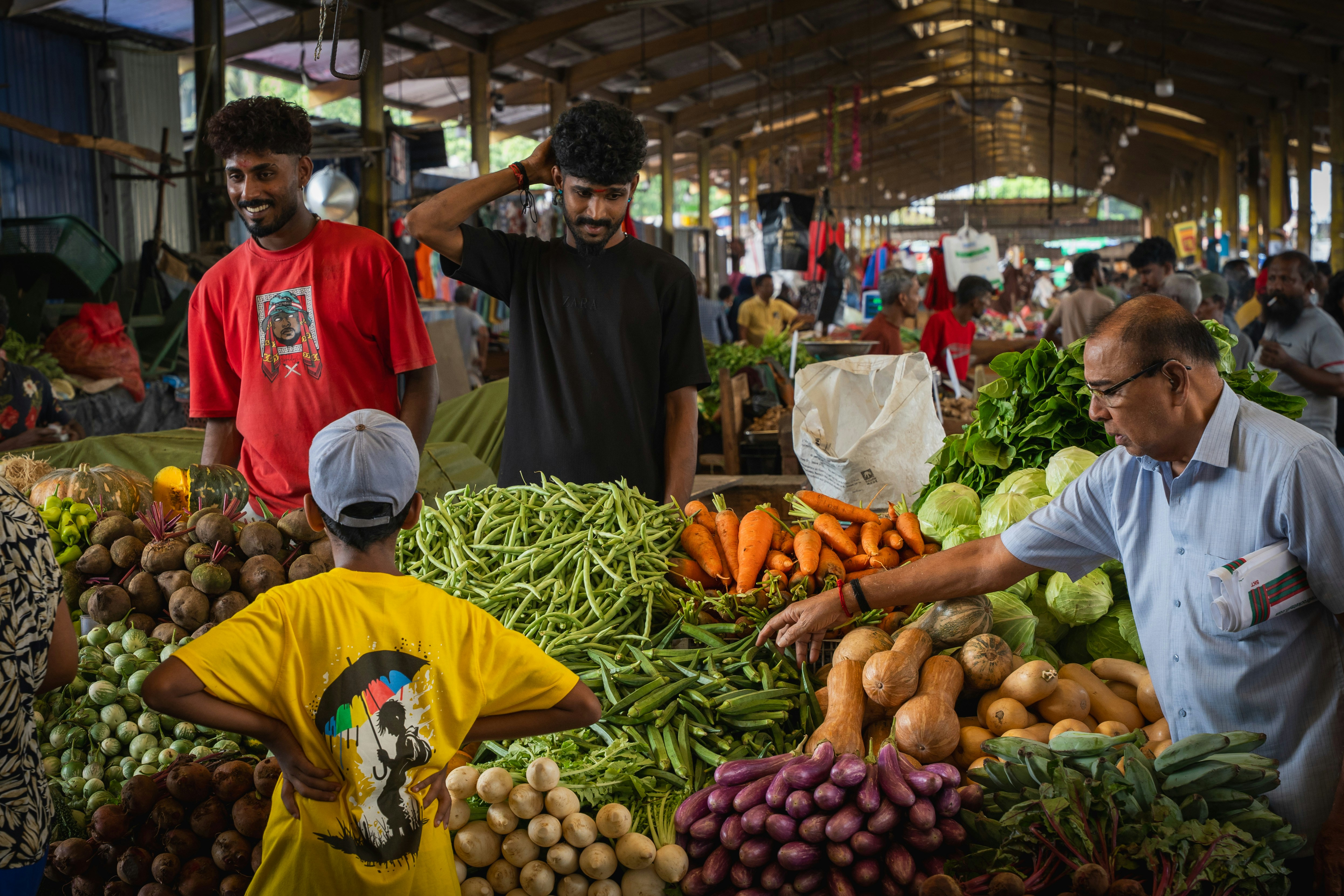 Market Portrait: A Colorful Stall Brimming with Produce and People