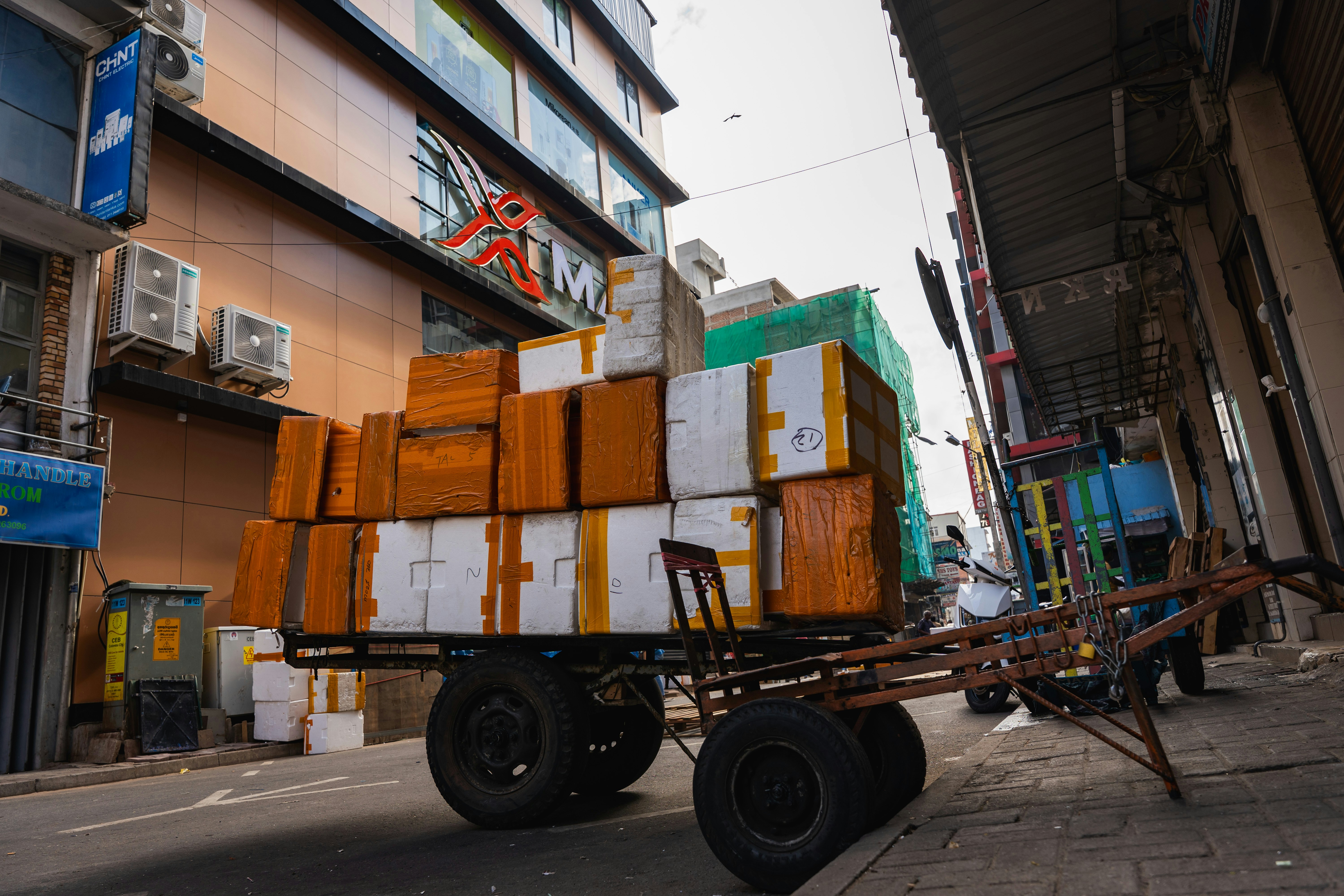 Cart of Cargo: A Street-Level Frame of Town-Bound Boxes